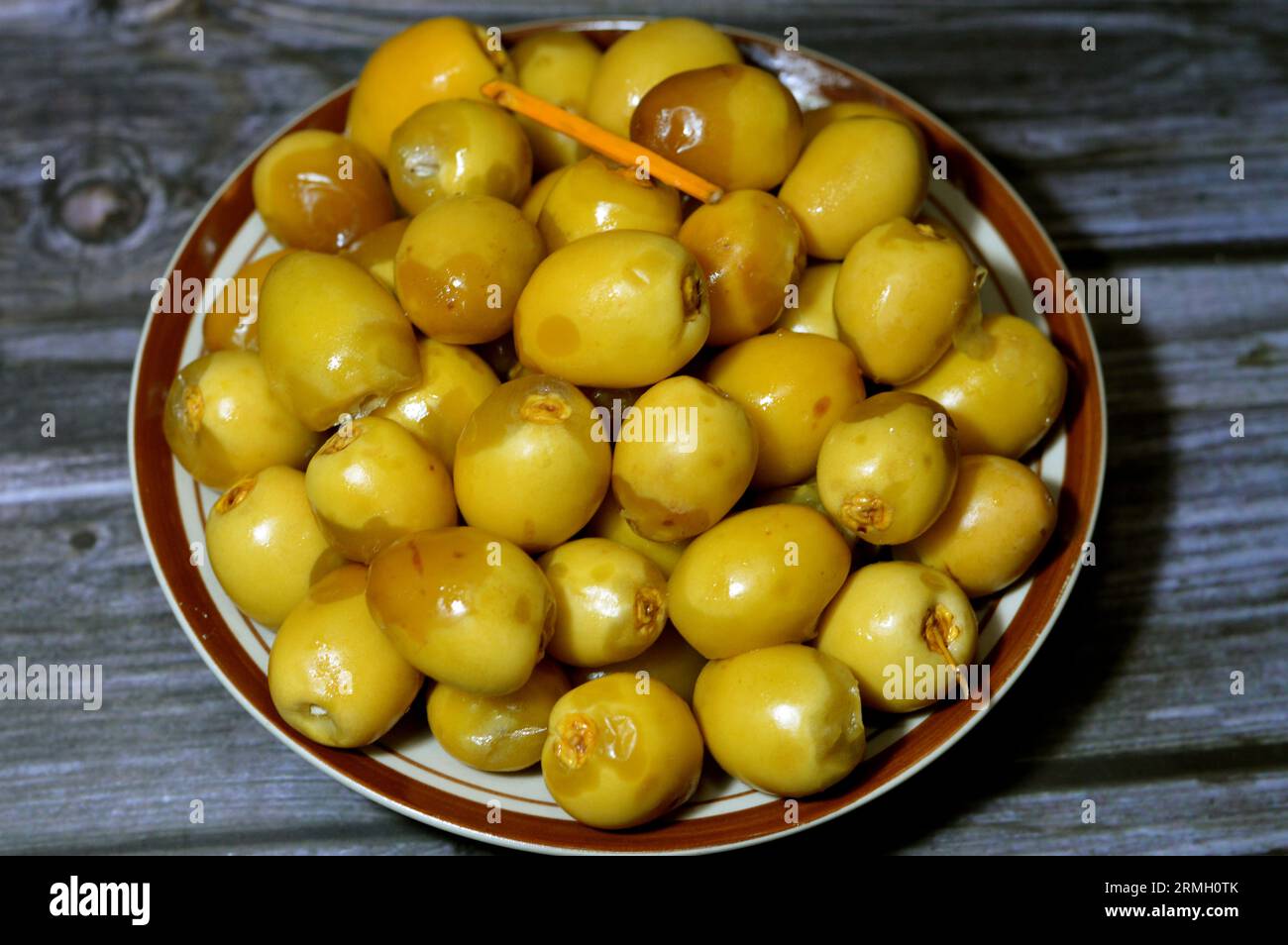 Yellow Barhi dates, botanically classified as Phoenix dactylifera ...