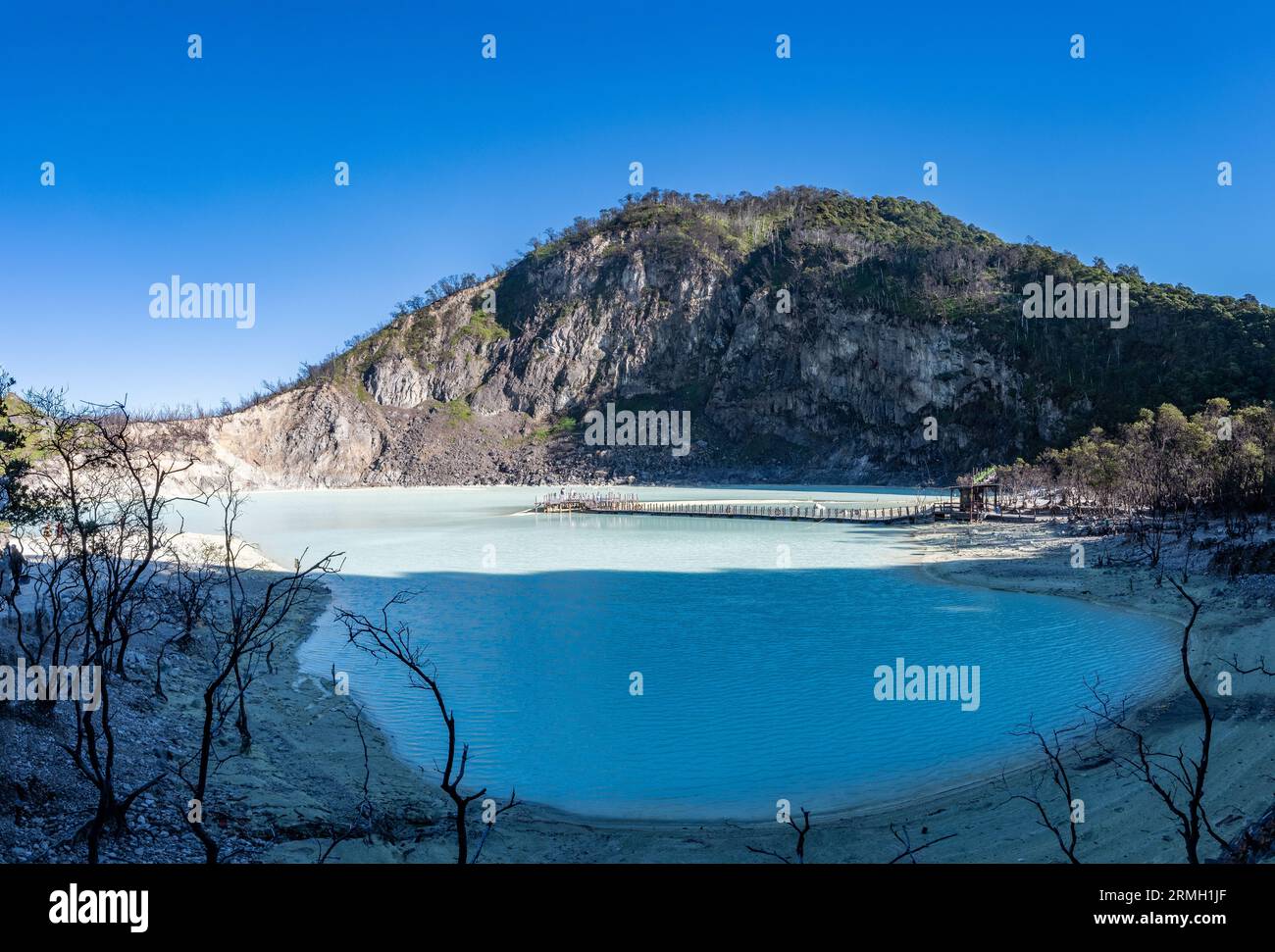 The volcanic crater lake with milky blue acidic water at Kawah Putih ...