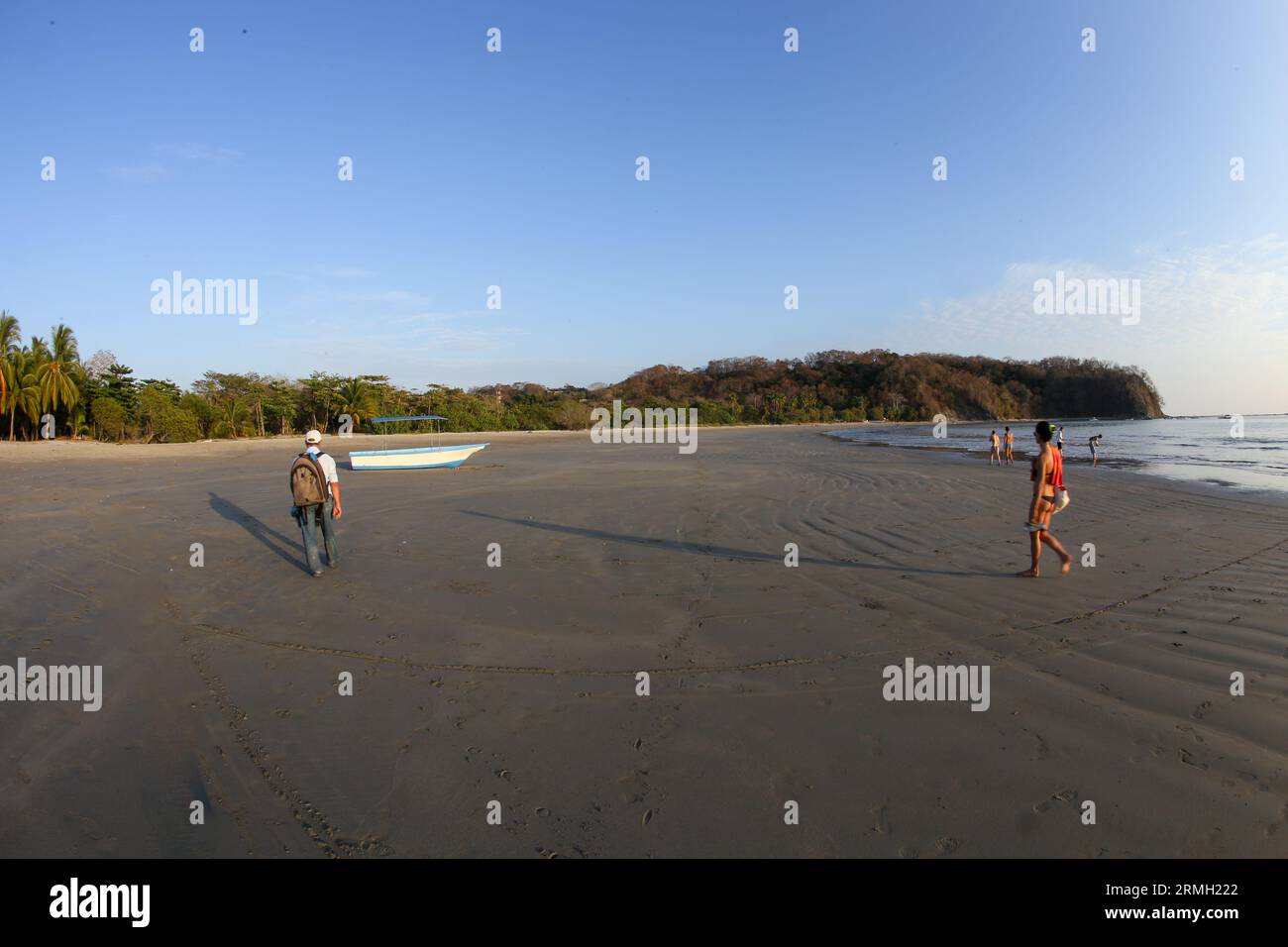 Wide angle on the Playa Nacional in Guanacaste with people walking on ...
