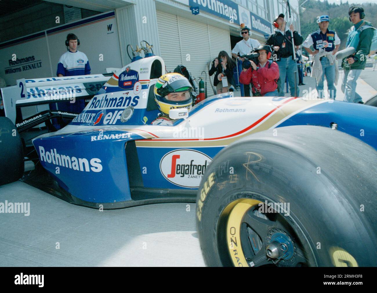 Ayrton Senna of Brazil, in a McLaren-Peugeot Formula One car, leaves ...