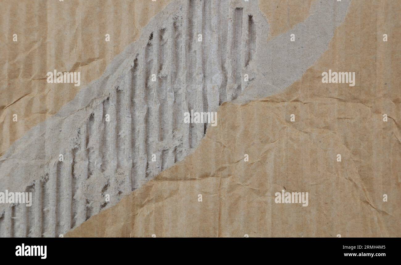 Close-up of brown ripped cardboard texture Stock Photo - Alamy
