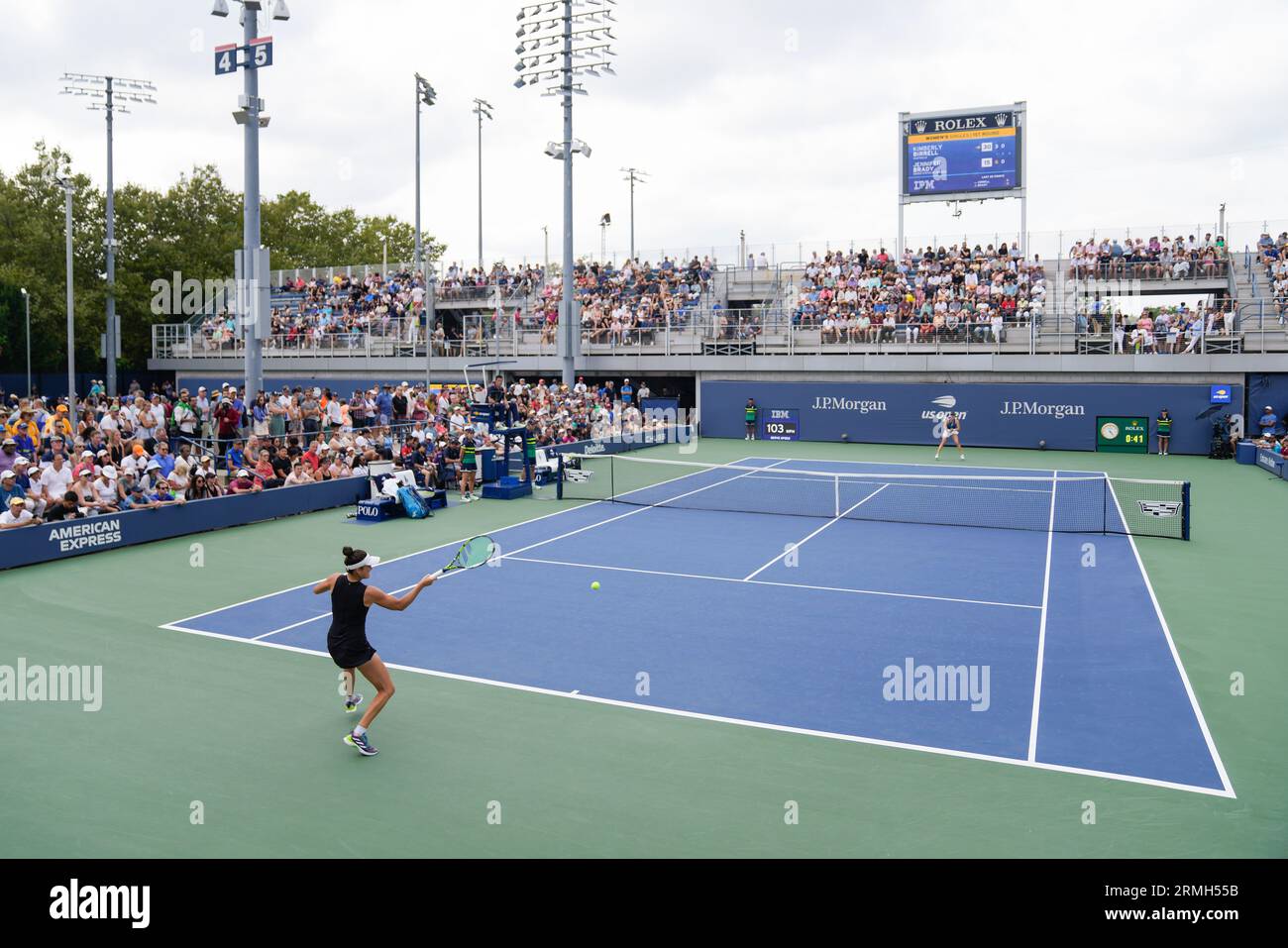 Jennifer Brady, of the United States, returns a shot to Kimberly ...
