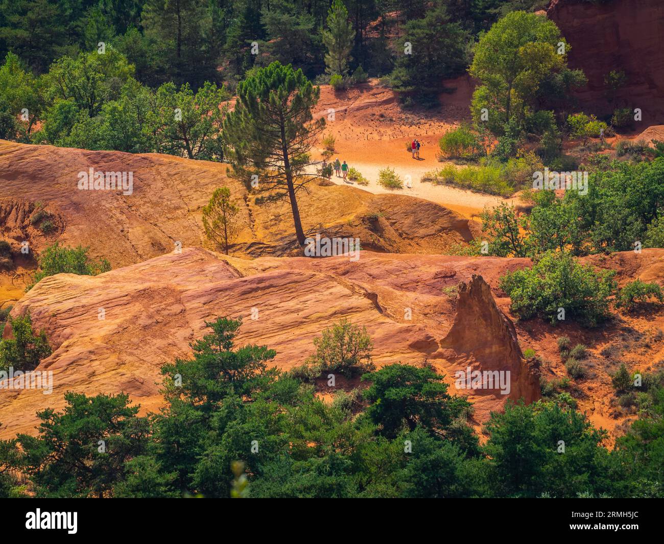 Rustrel, France - 12 August 2023: Abstract Rustrel canyon ocher cliffs ...