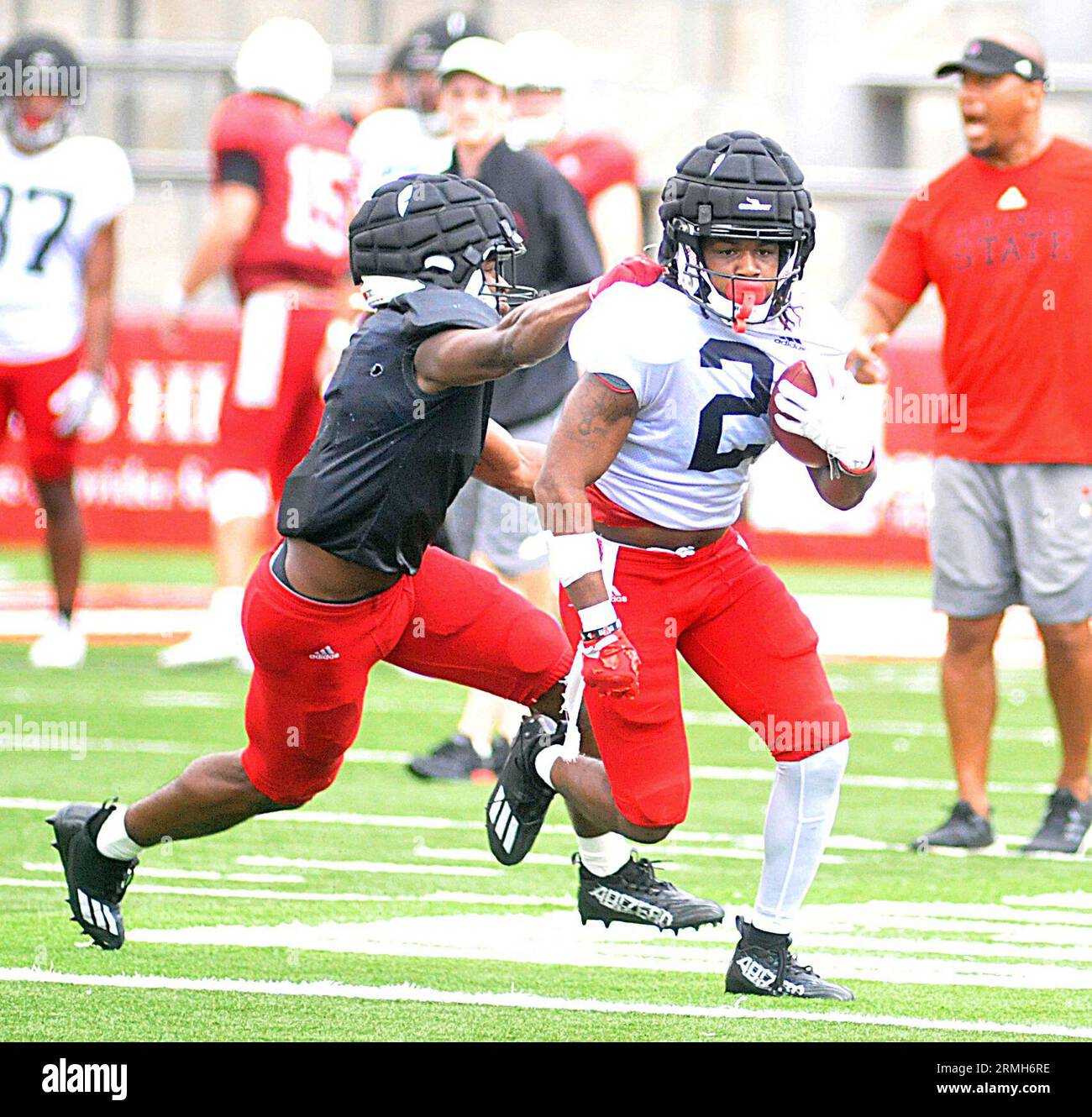 Arkansas running back Ja'Quez Cross (2) tries to elude a defender ...