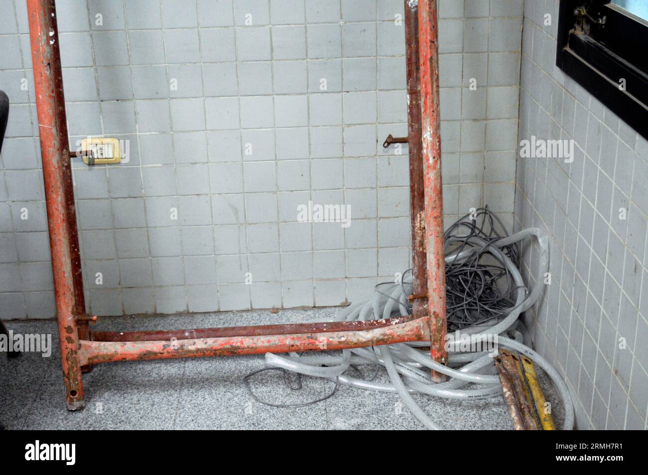 A disassembled metal scaffold, a temporary structure constructed using ...