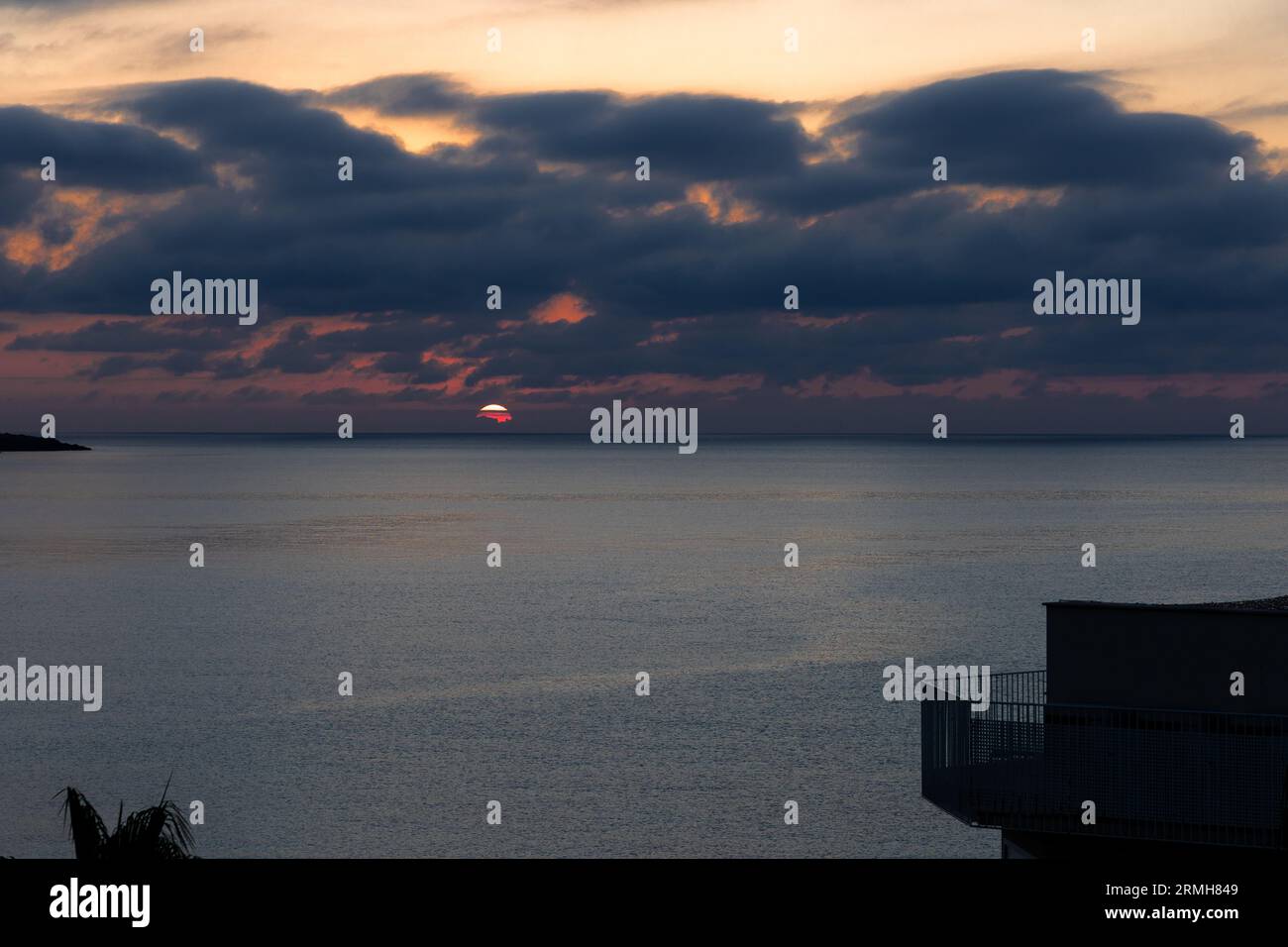 Sunrise over the sea at S'Illot Stock Photo - Alamy
