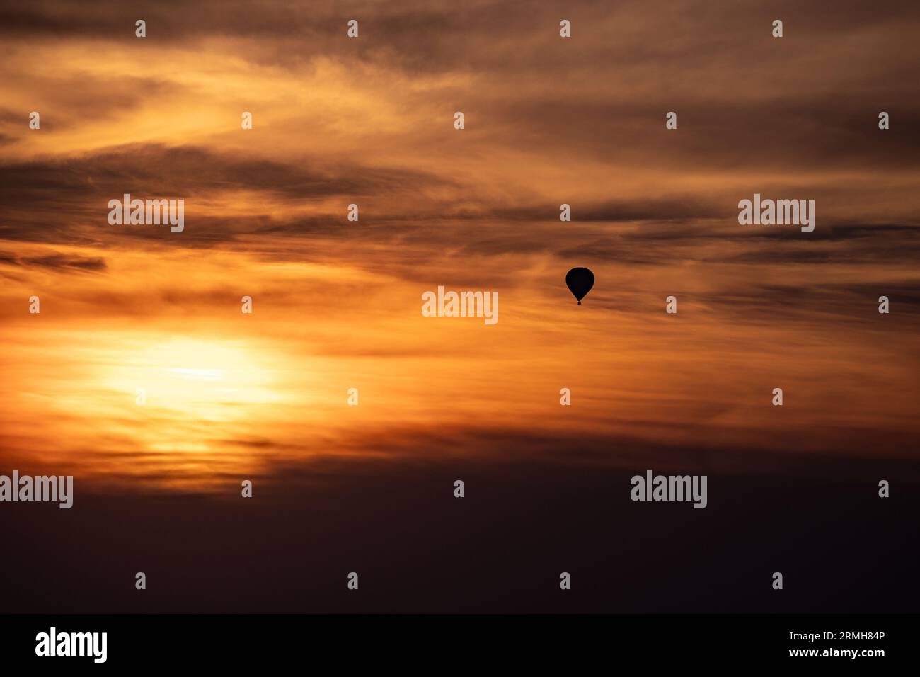 Hot air balloon clouds sunset hi-res stock photography and images - Alamy