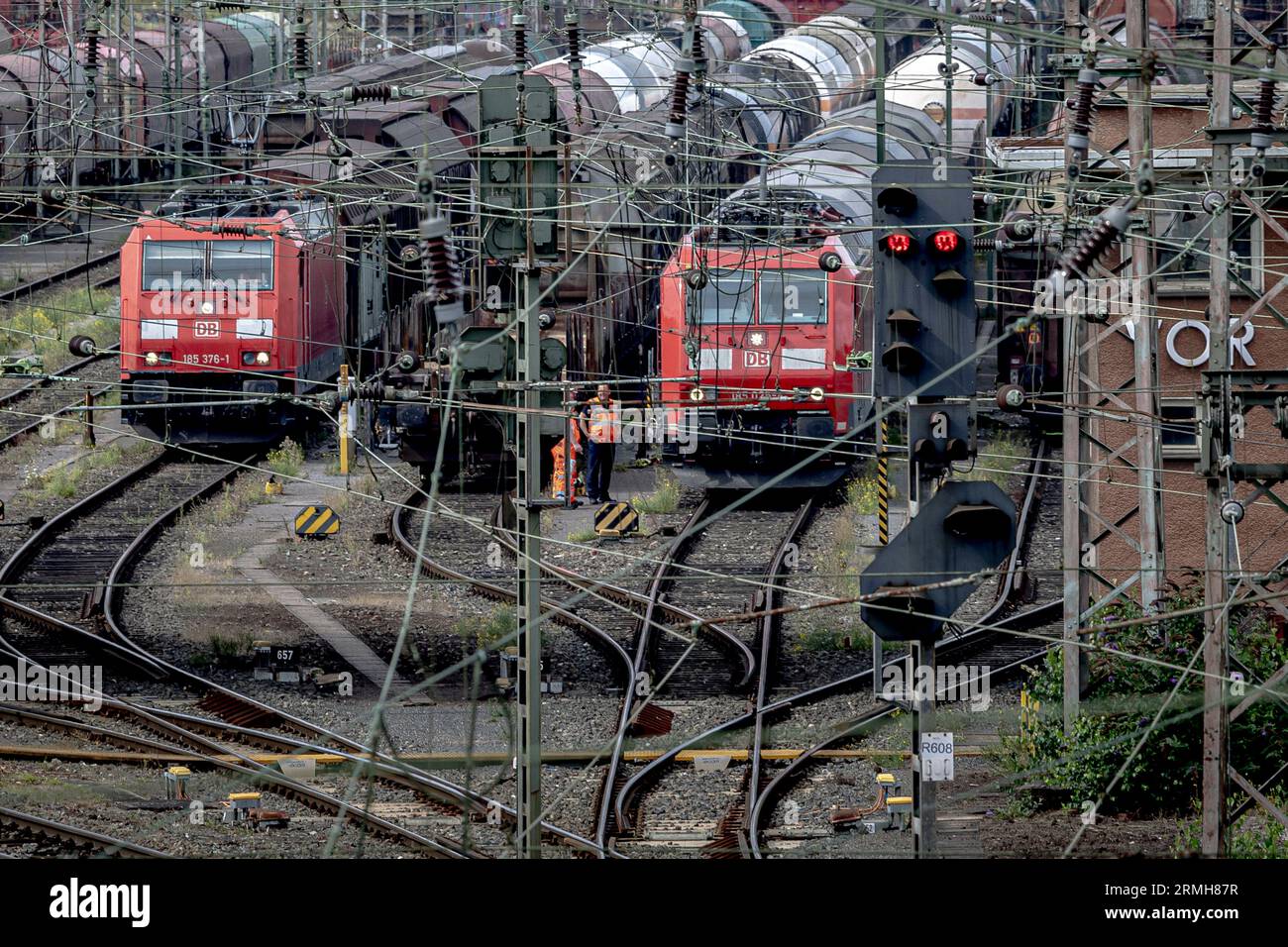 Hagen, Germany. 28th Aug, 2023. Two freight trains hauled with ...