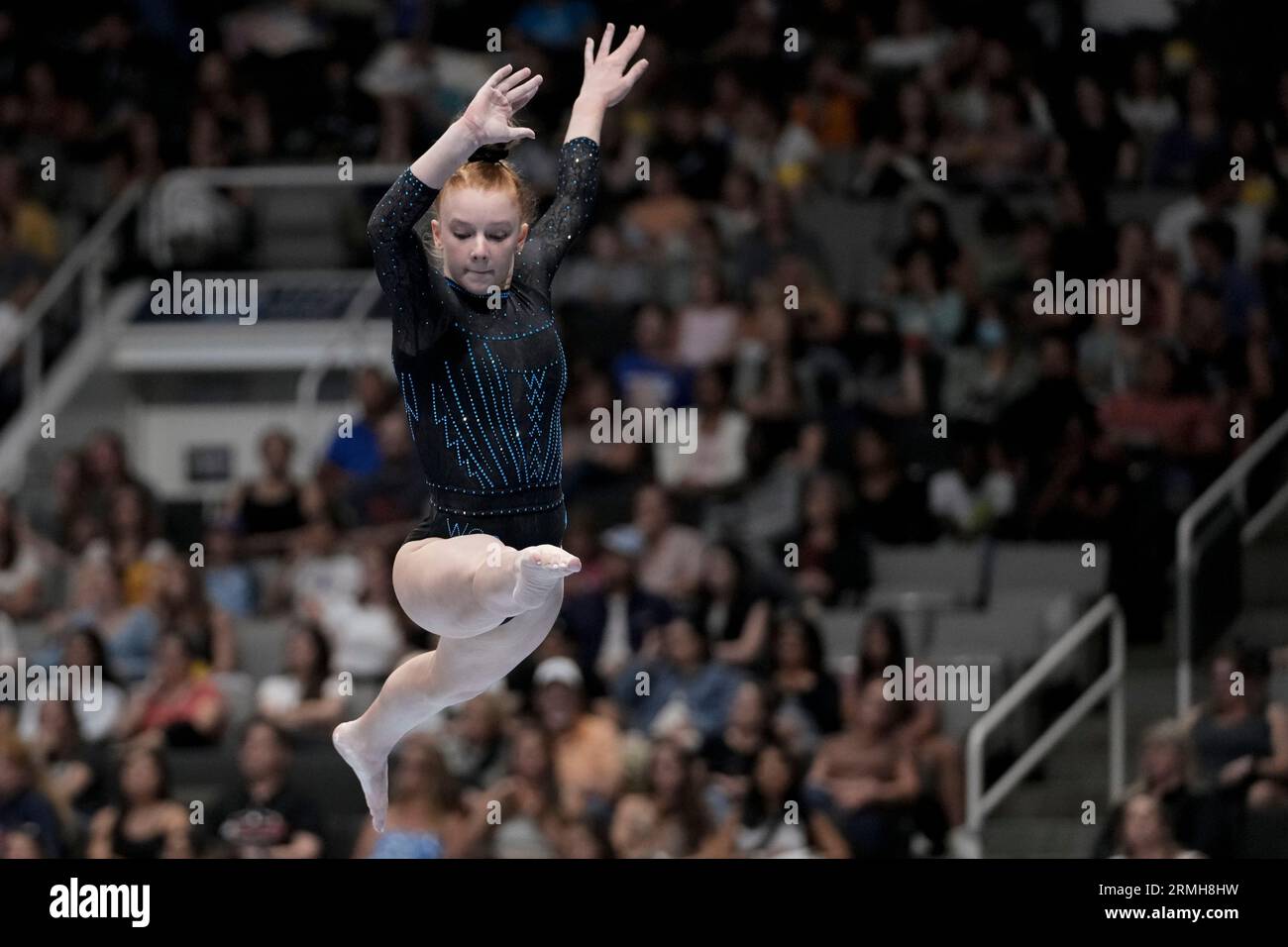 Dulcy Caylor competes on the balance beam during the U.S. Gymnastics ...