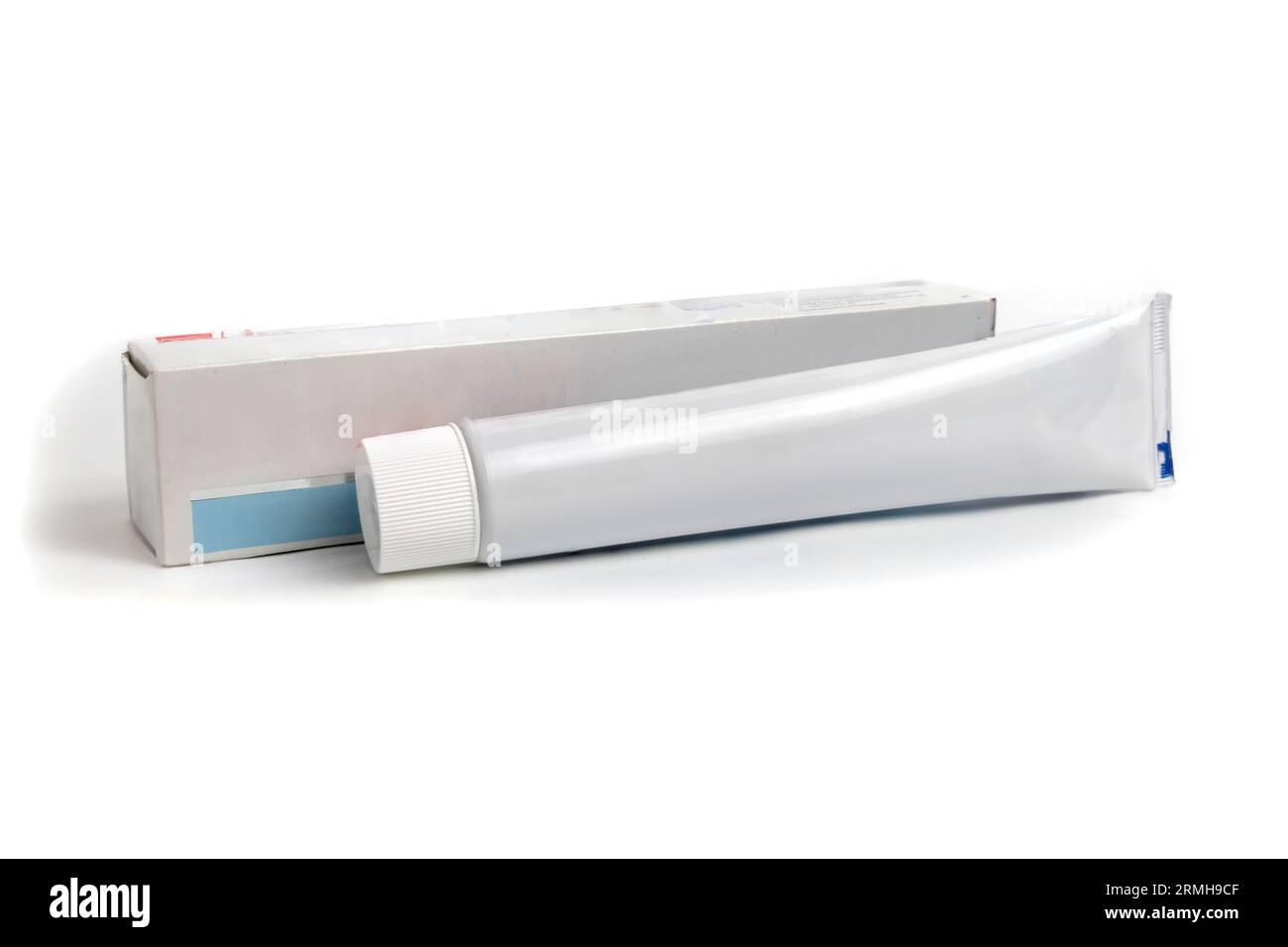 A tube of toothpaste with a box Stock Photo - Alamy