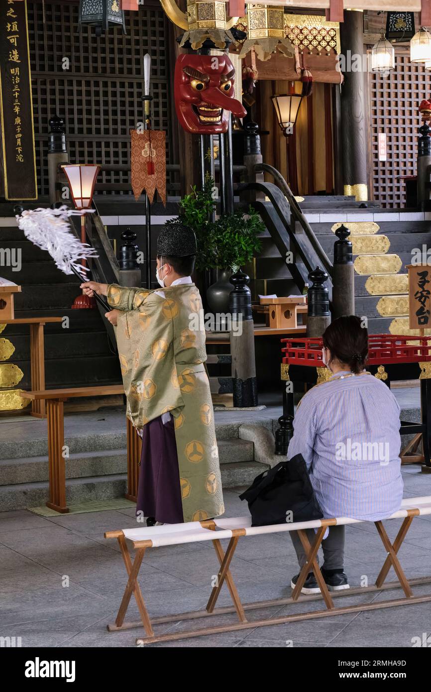 Japan, Fukuoka, Hakata. Shinto Priest Performing a Ceremony for a ...