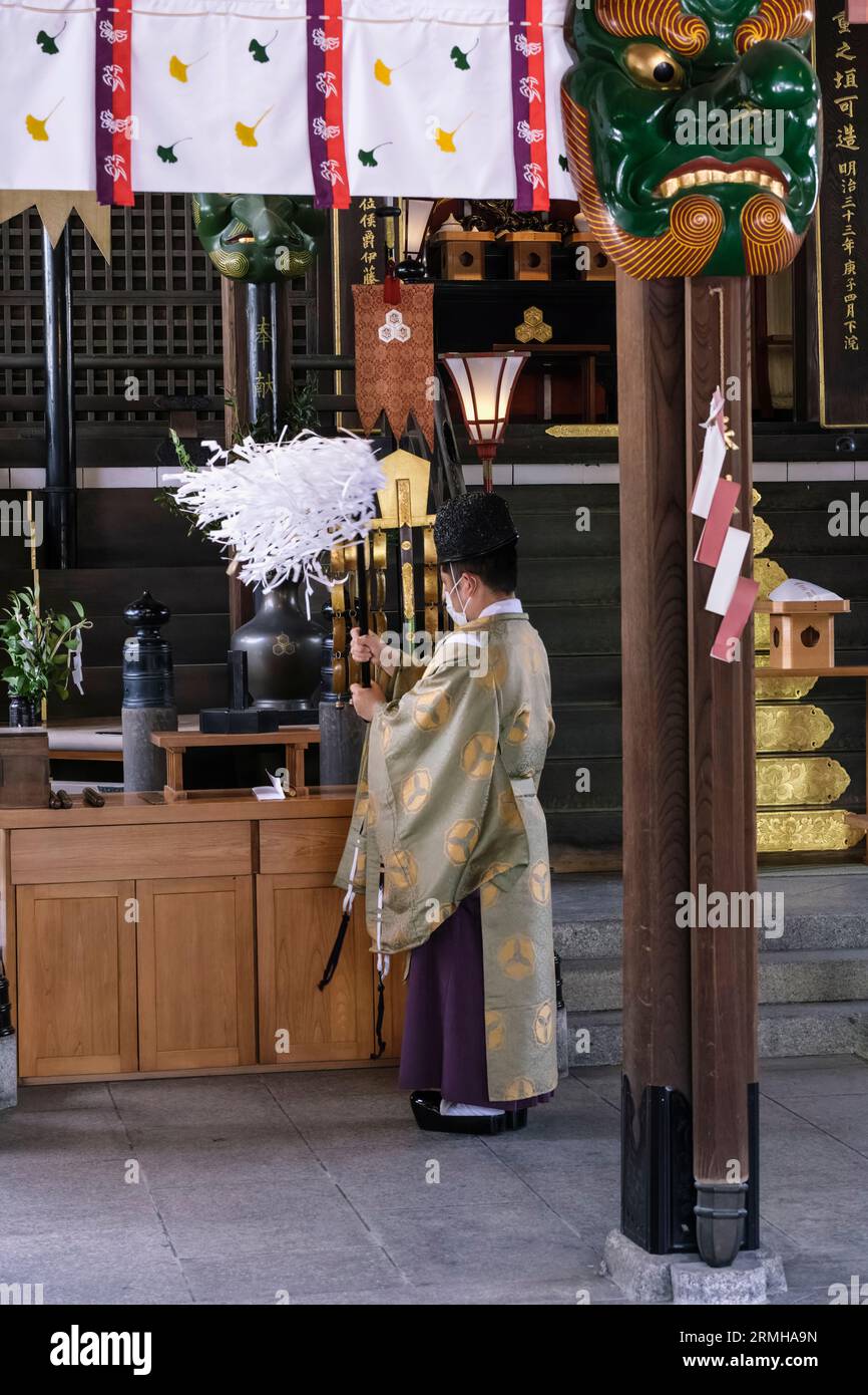 Japan, Fukuoka, Hakata. Shinto Priest Performing a Ceremony for a ...