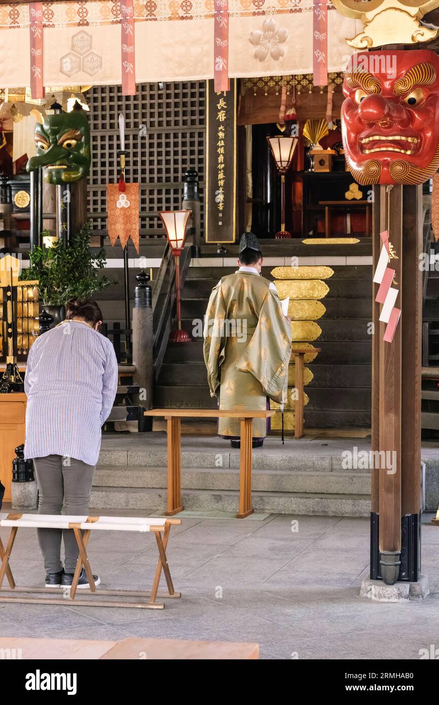 Japan, Fukuoka, Hakata. Shinto Priest Performing a Ceremony at Kushida ...
