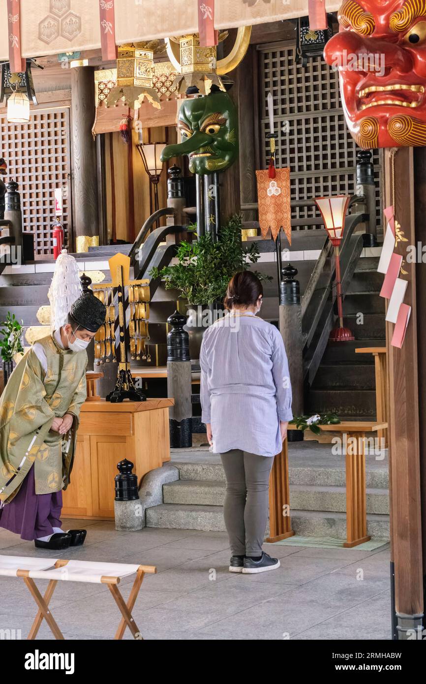 Japan, Fukuoka, Hakata. Shinto Priest Performing a Ceremony for a ...