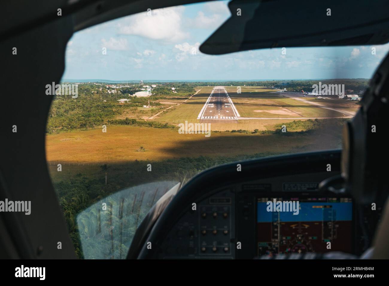 view of the runway through the windshield landing at Philip S.W ...