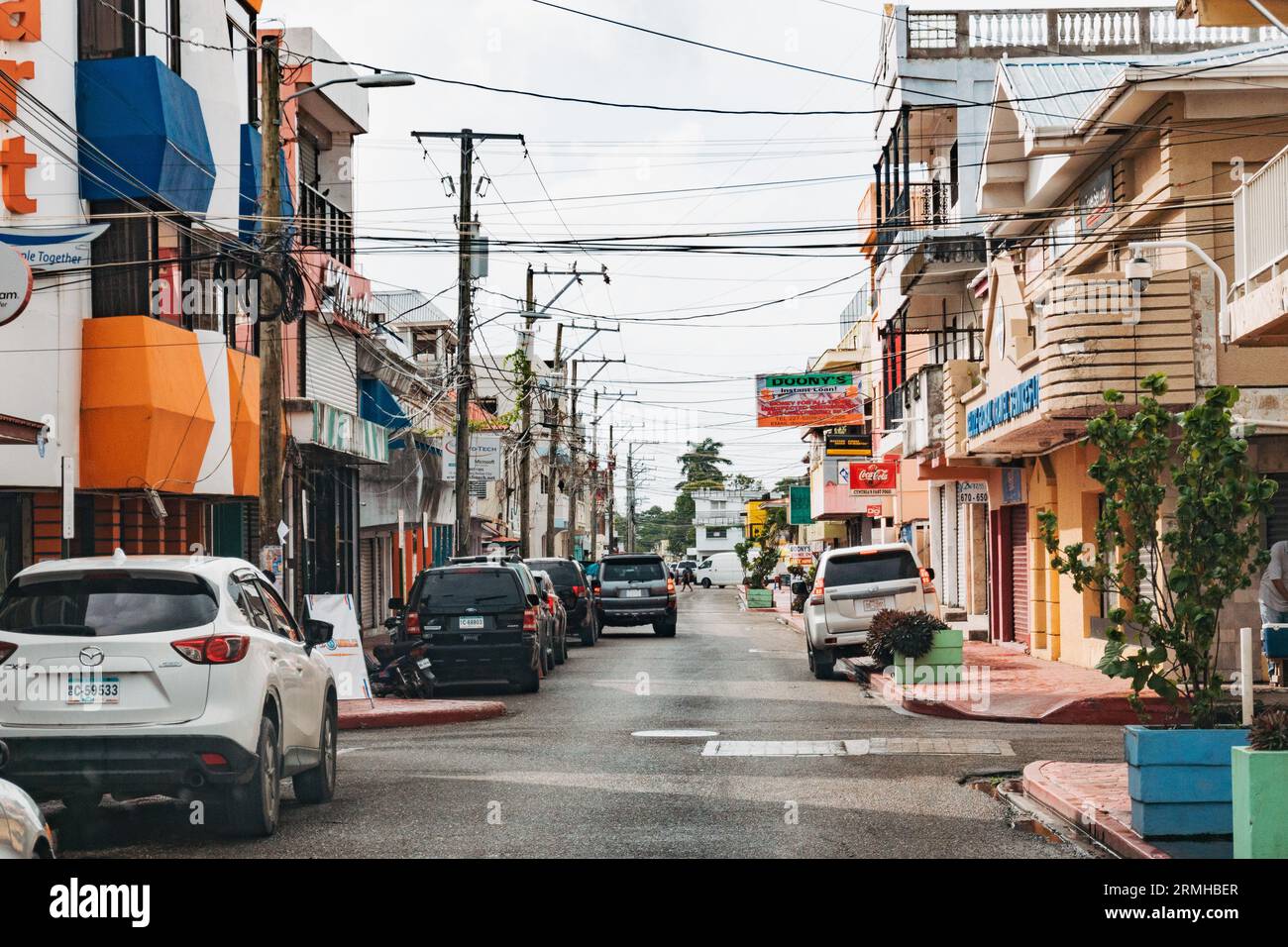 looking down Prince St, a commercial street in Belize City center ...