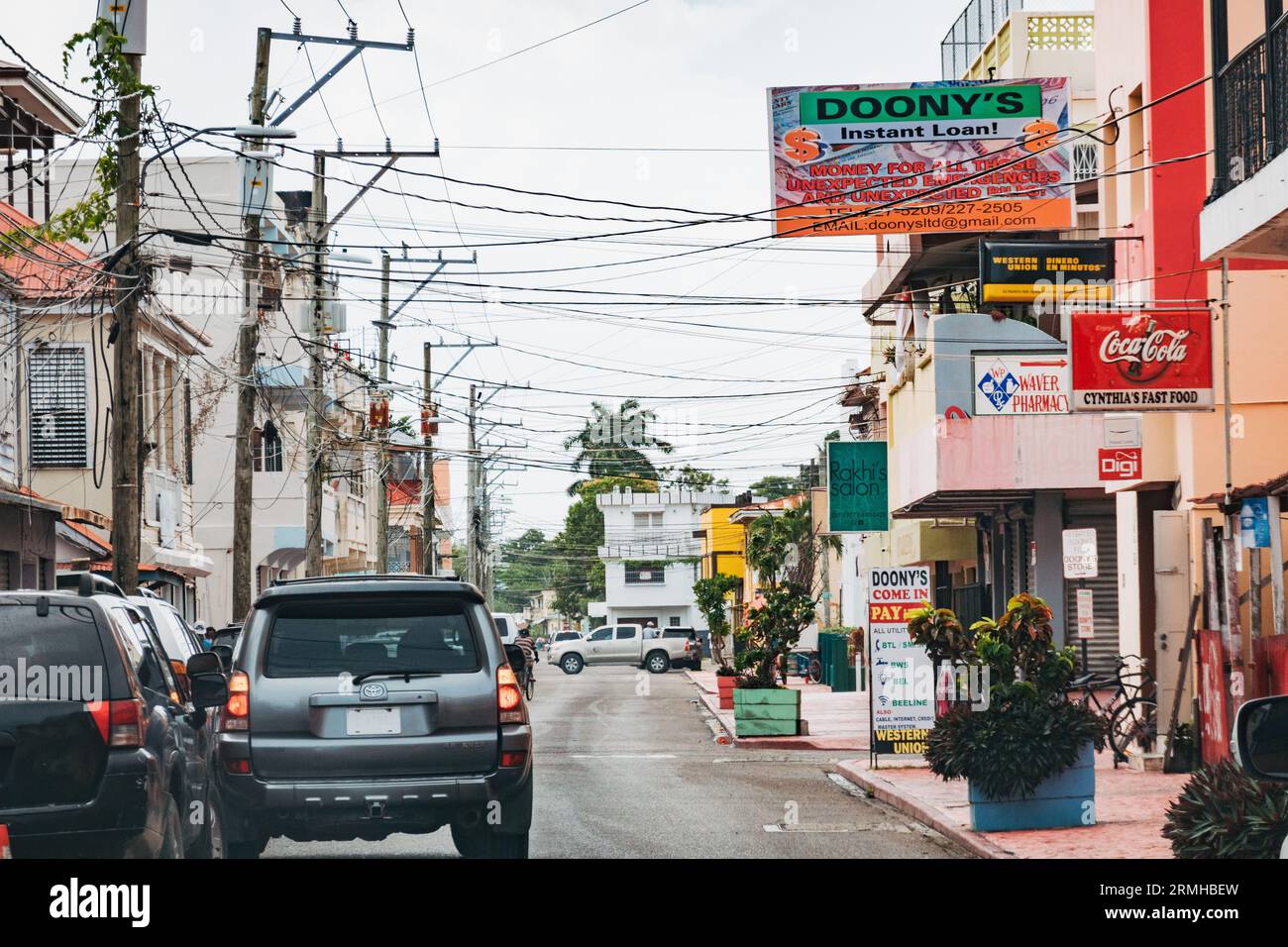 looking down Prince St, a commercial street in Belize City center ...