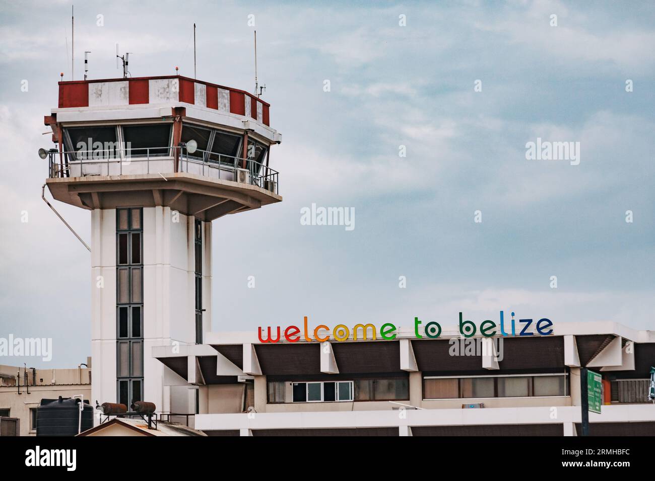 The control tower and airport building at Philip S.W. Goldson ...