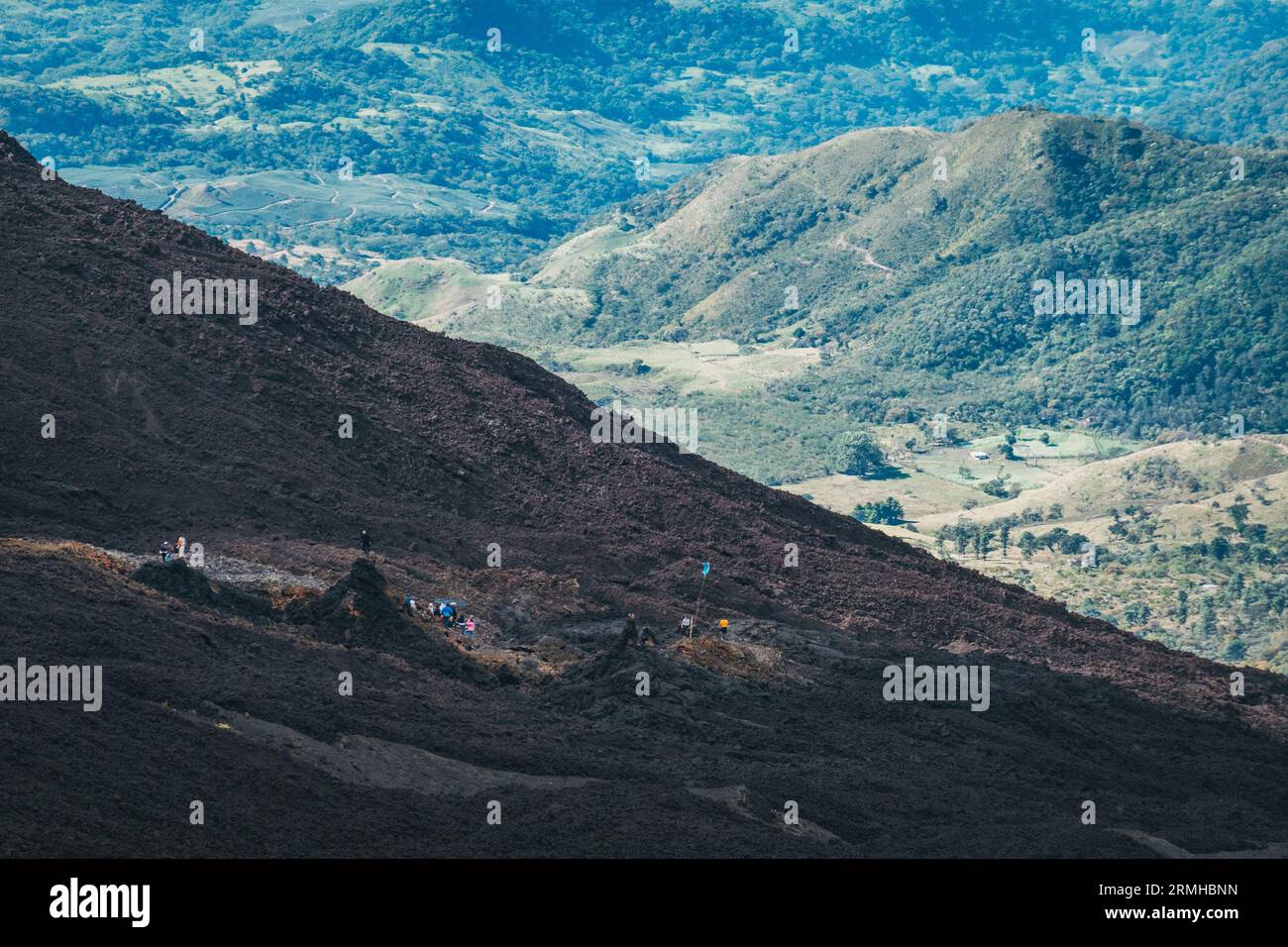 The dark, hot volcanic slopes of the Pacaya Volcano, Guatemala Stock ...