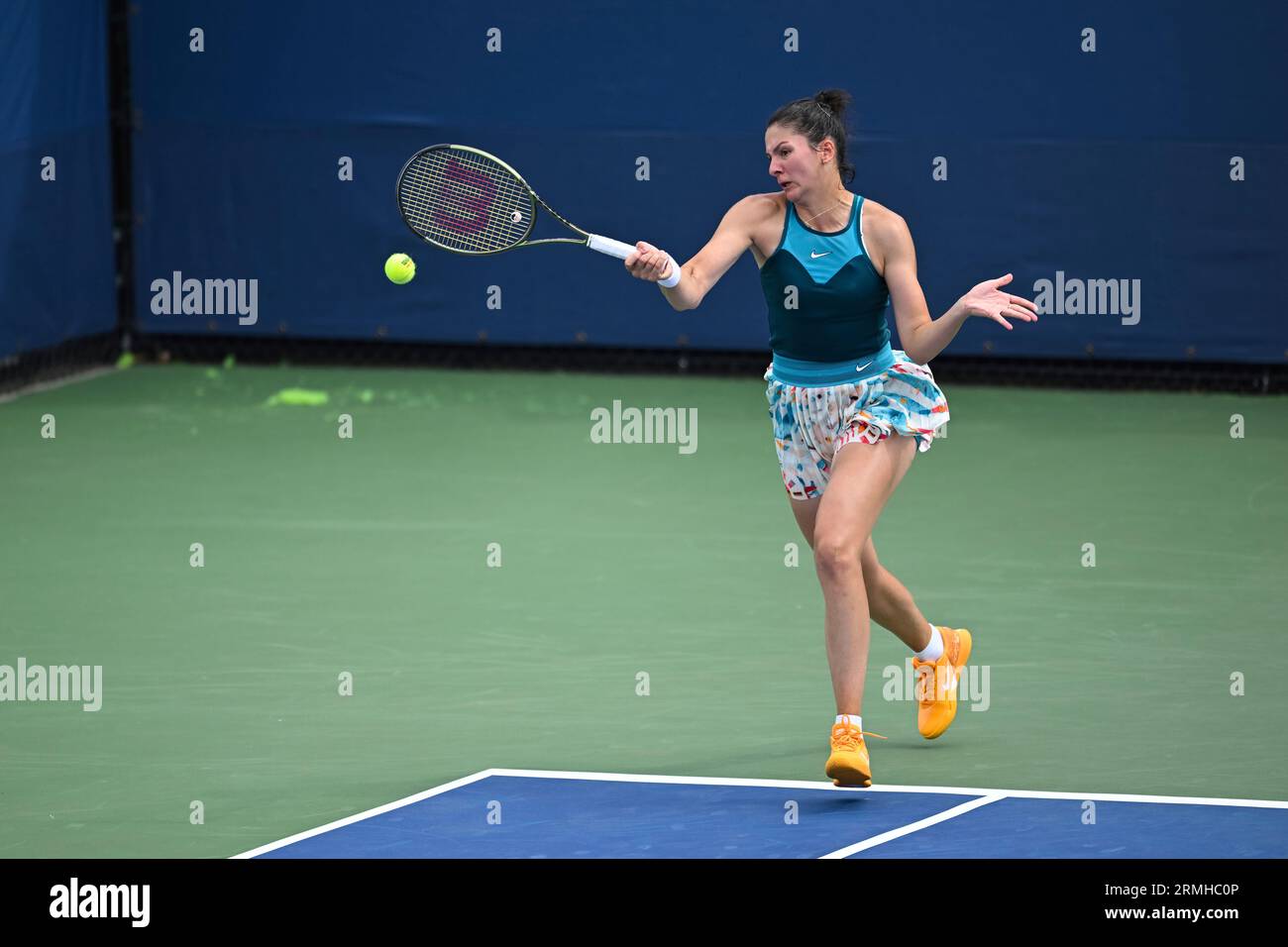 Margarita Betova hits a forehand during a women's singles match at the ...