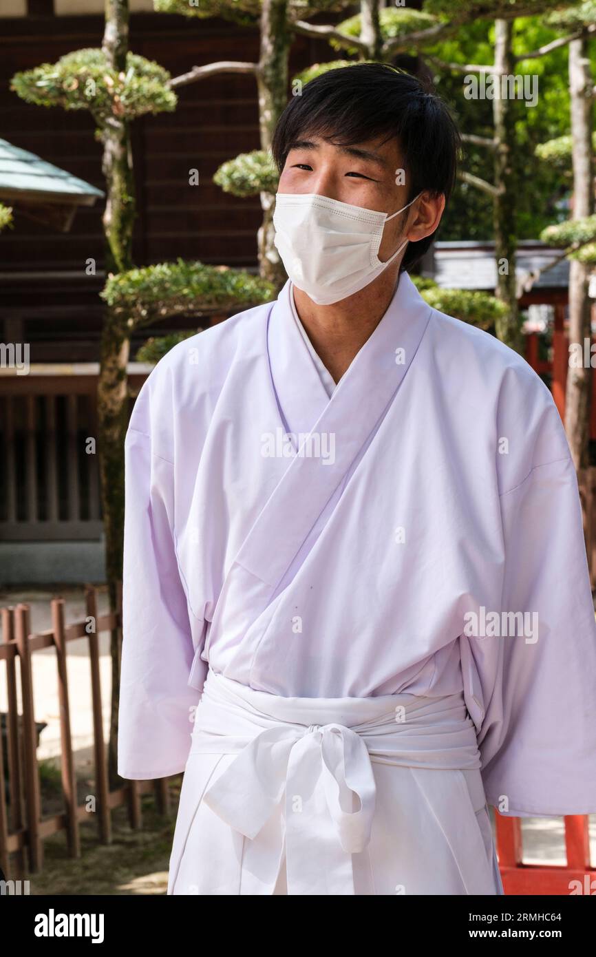 Japan, Fukuoka, Kyushu. Sumiyoshi Shinto Shrine. Young Shinto Priest ...