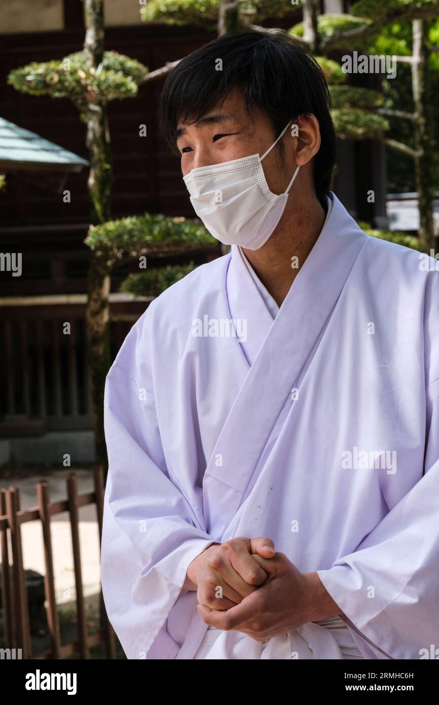 Japan, Fukuoka, Kyushu. Sumiyoshi Shinto Shrine. Young Shinto Priest ...