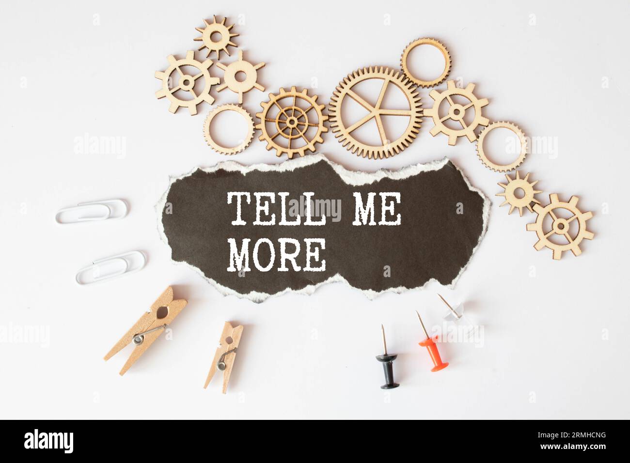 Tell me more symbol. Concept words Tell me more on wooden notebook ...