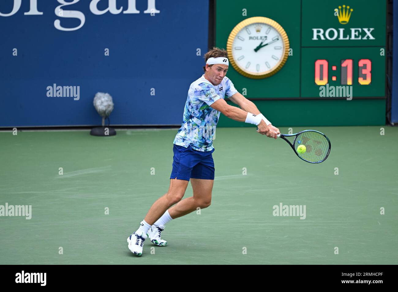 Casper Ruud hits a backhand during a men's singles match at the 2023 US ...