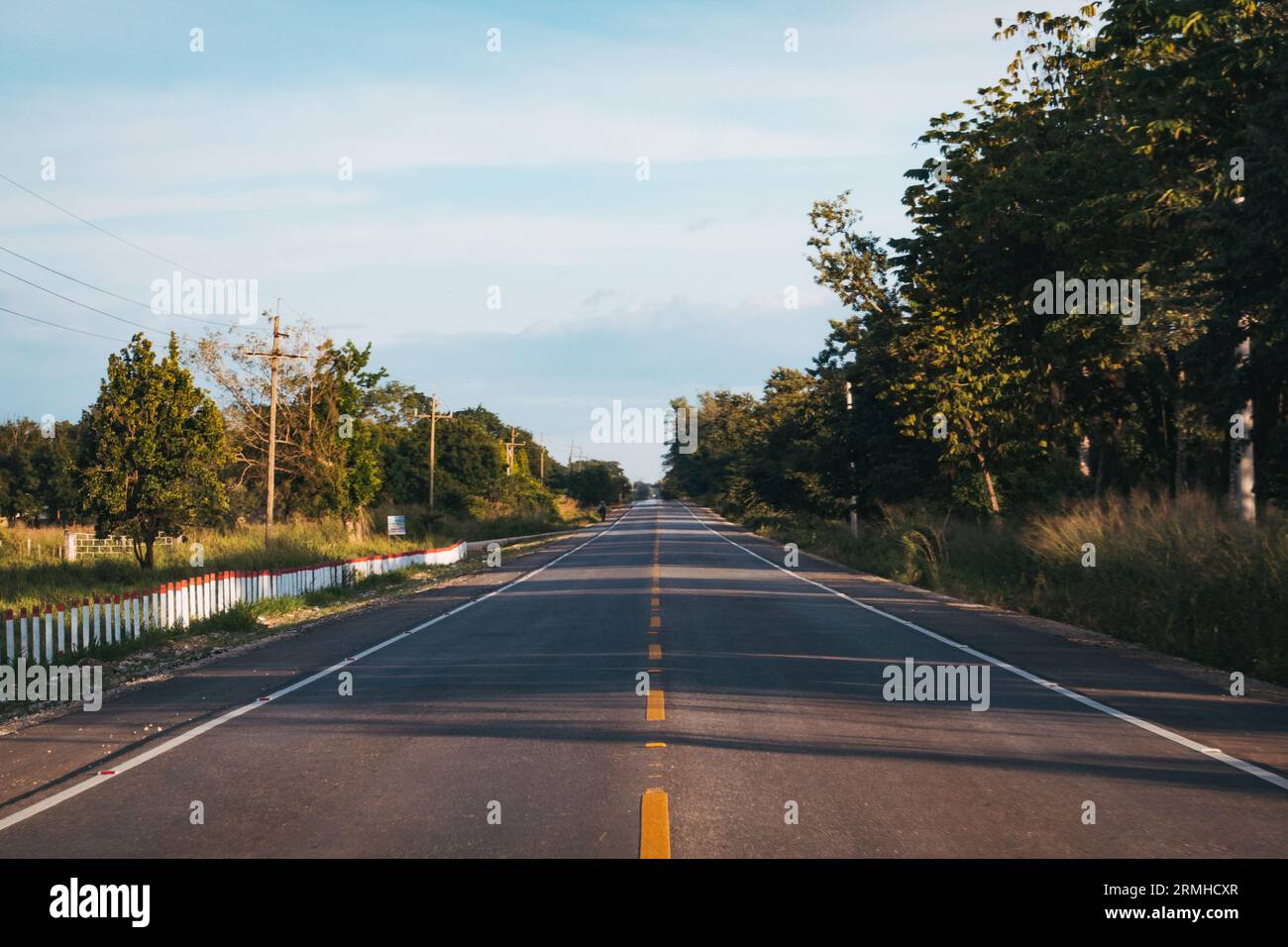 a long straight, empty single-lane road in good condition near Las ...