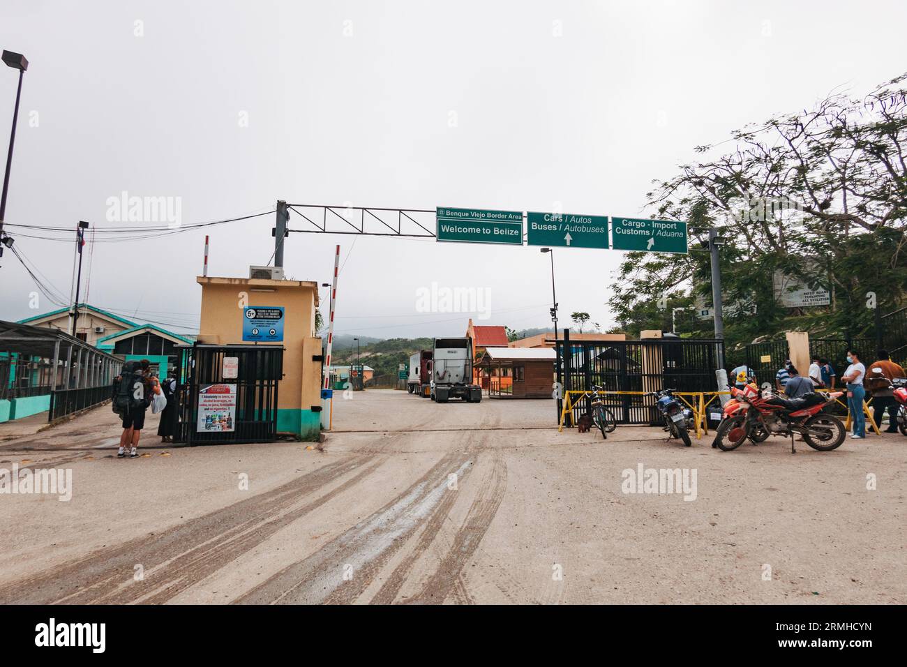 a "Welcome to Belize" and customs traffic signs at the land border ...