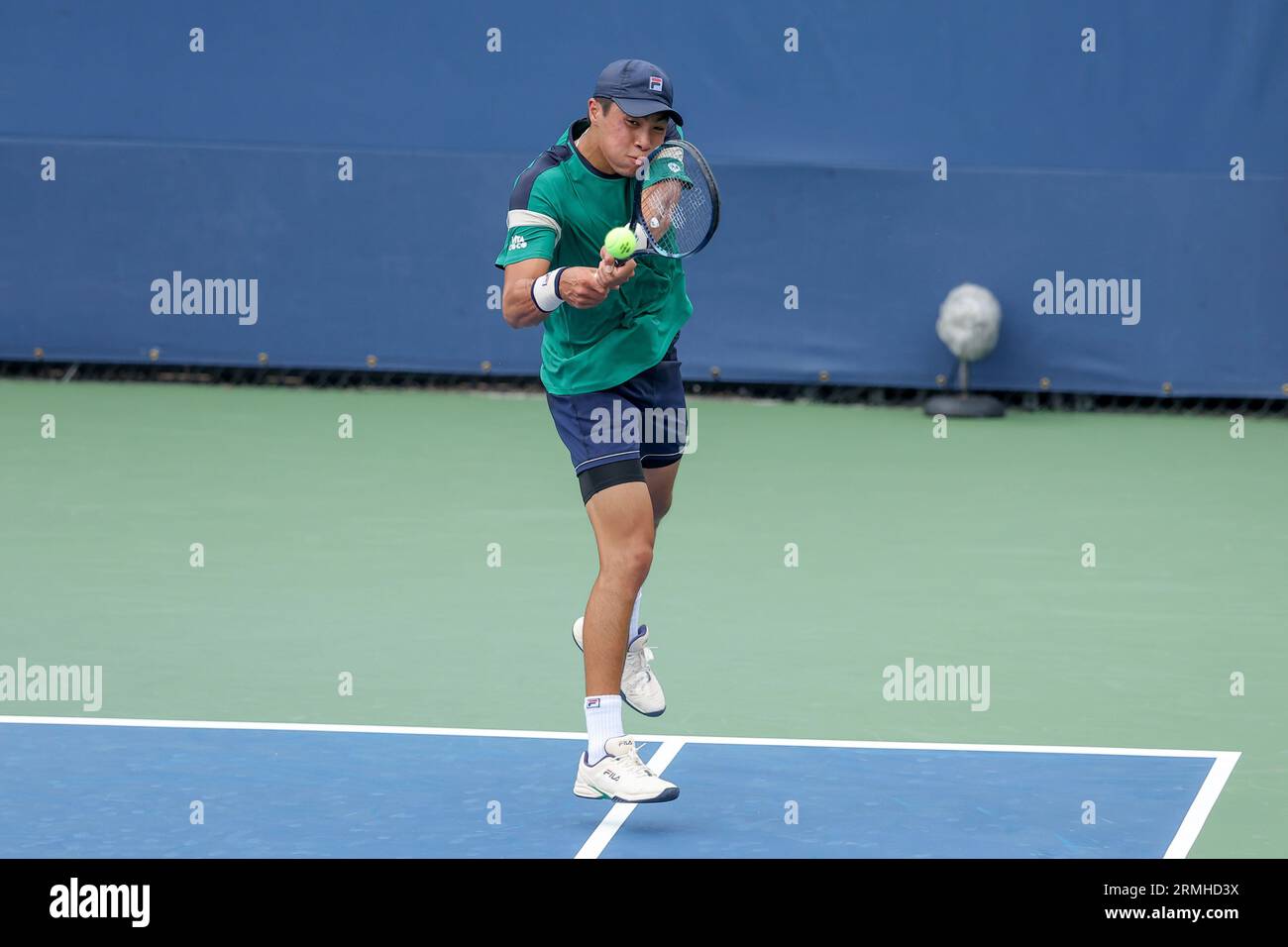 Brandon Nakashima in action during a men's singles match at the 2023 US ...