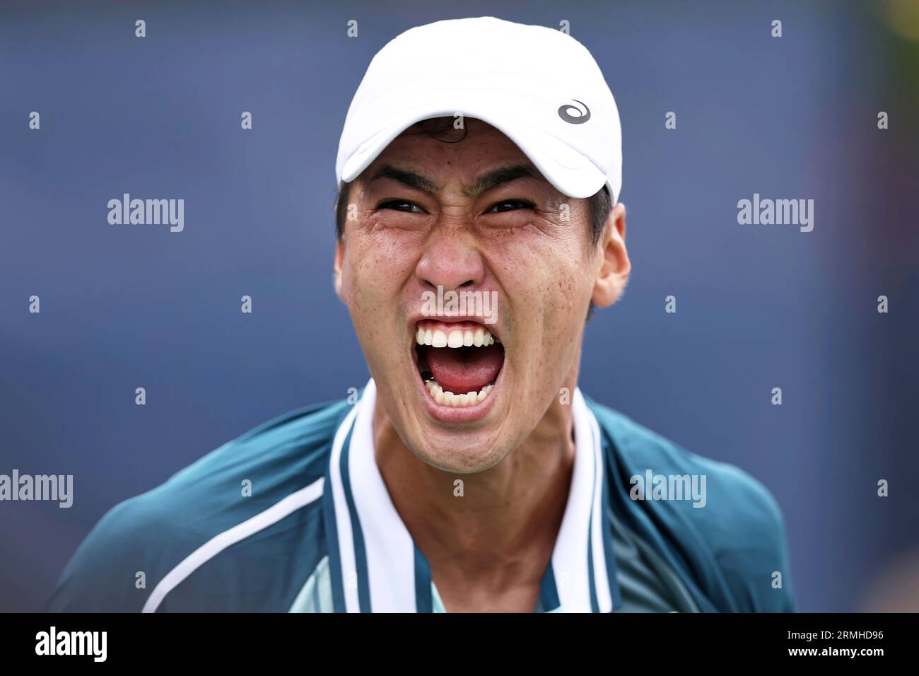 Yosuke Watanuki celebrates during a men's singles match at the 2023 US ...