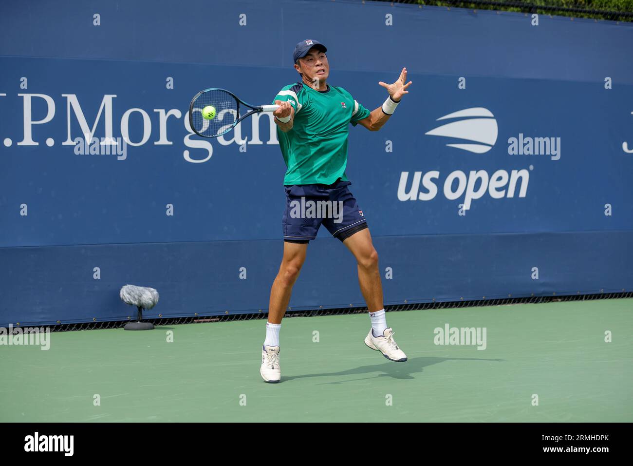 Brandon Nakashima in action during a men's singles match at the 2023 US ...
