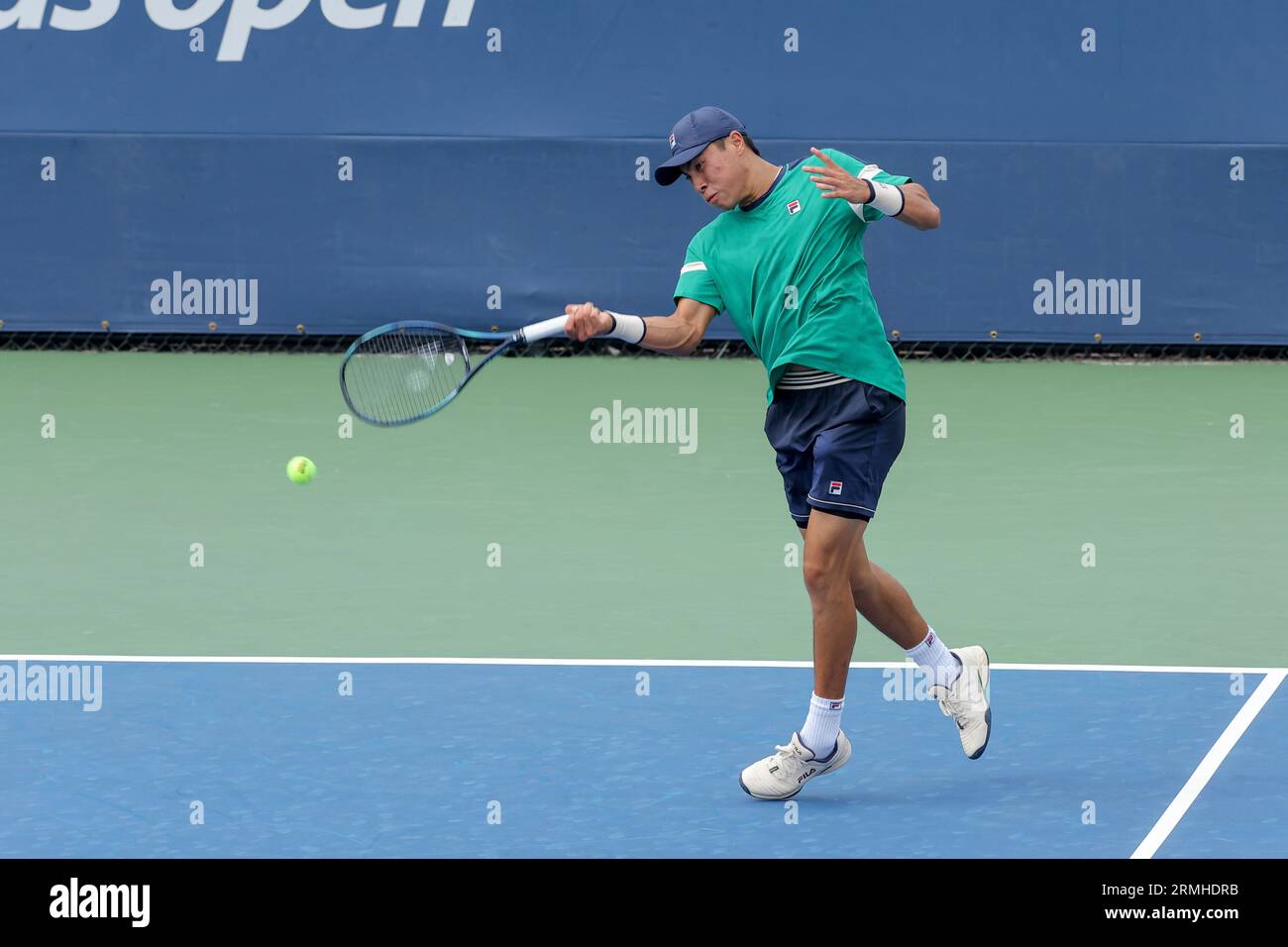Brandon Nakashima in action during a men's singles match at the 2023 US ...