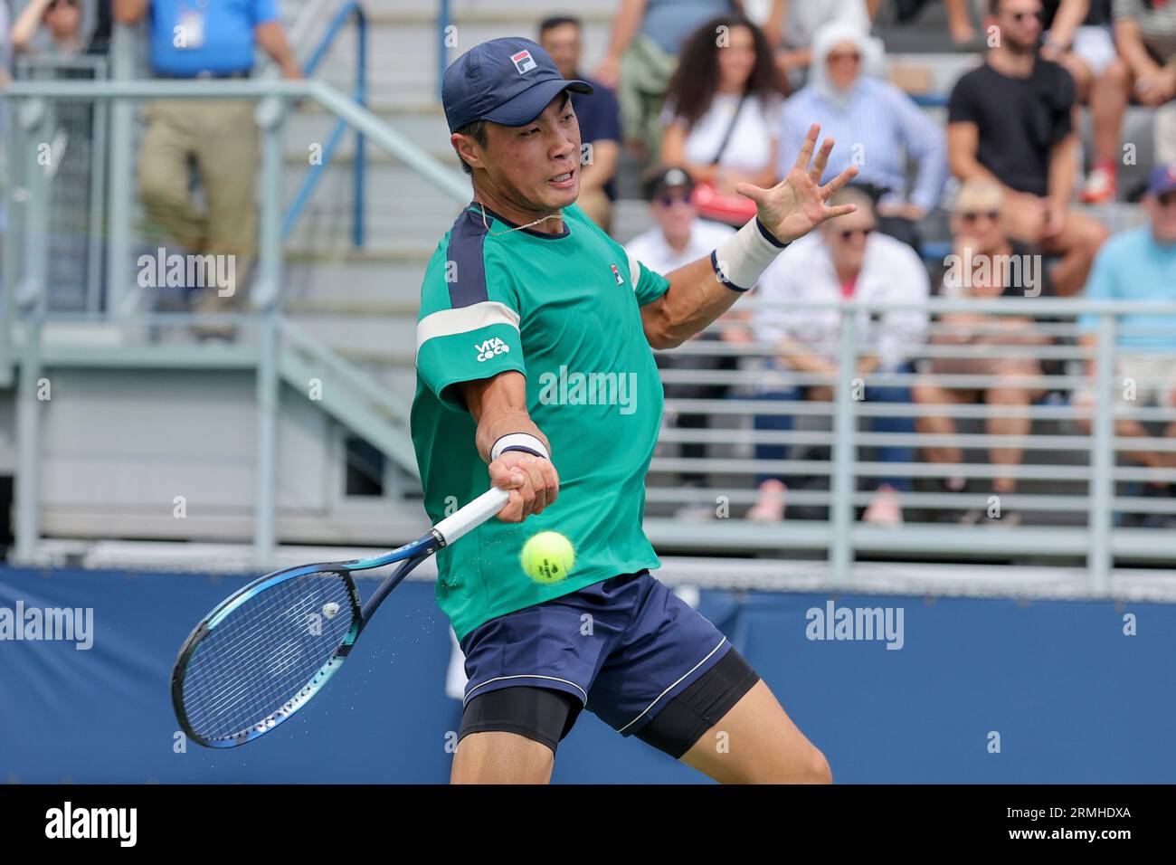 Brandon Nakashima in action during a men's singles match at the 2023 US ...