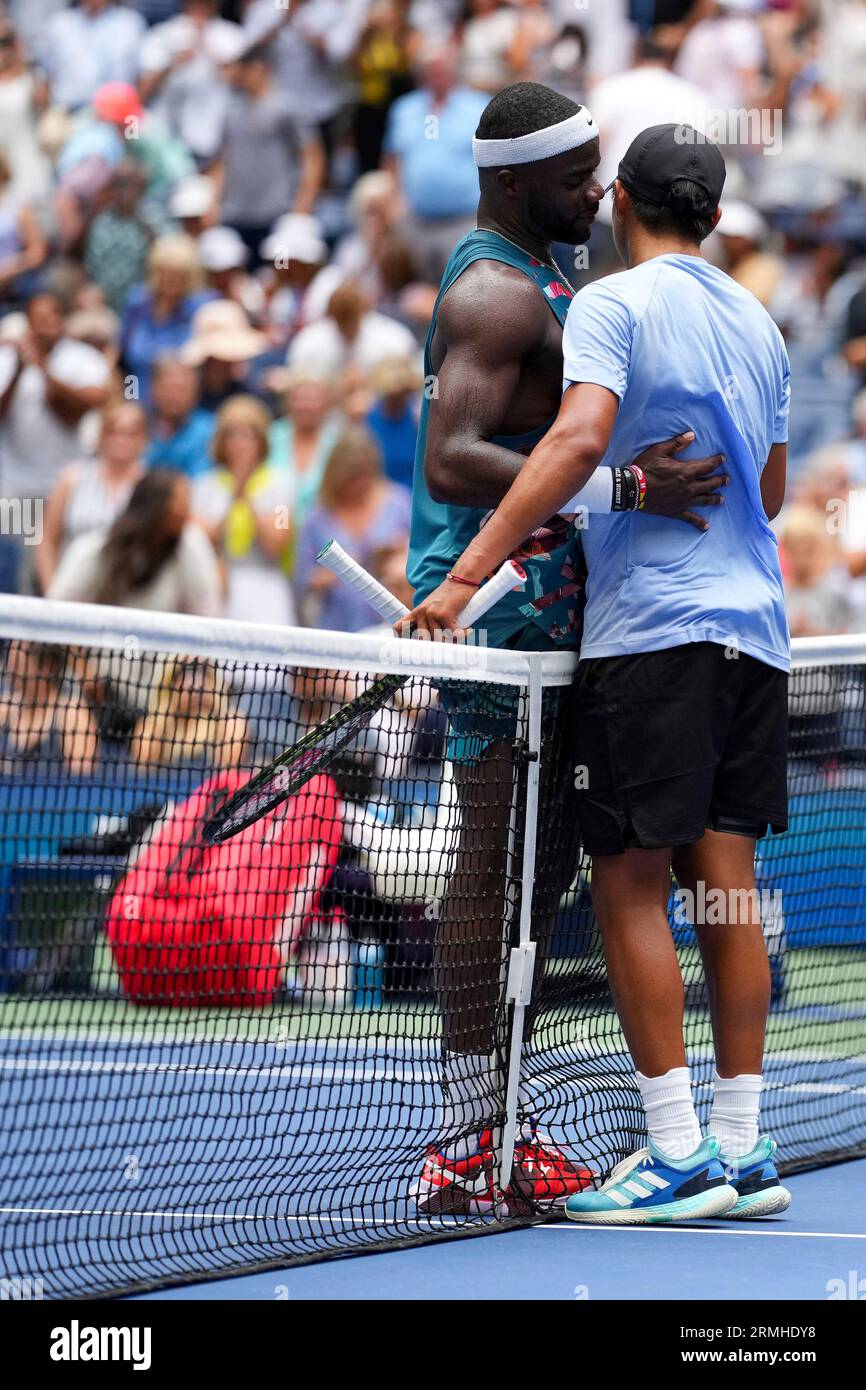 Frances Tiafoe hugs Learner Tien after a men's singles match at the ...