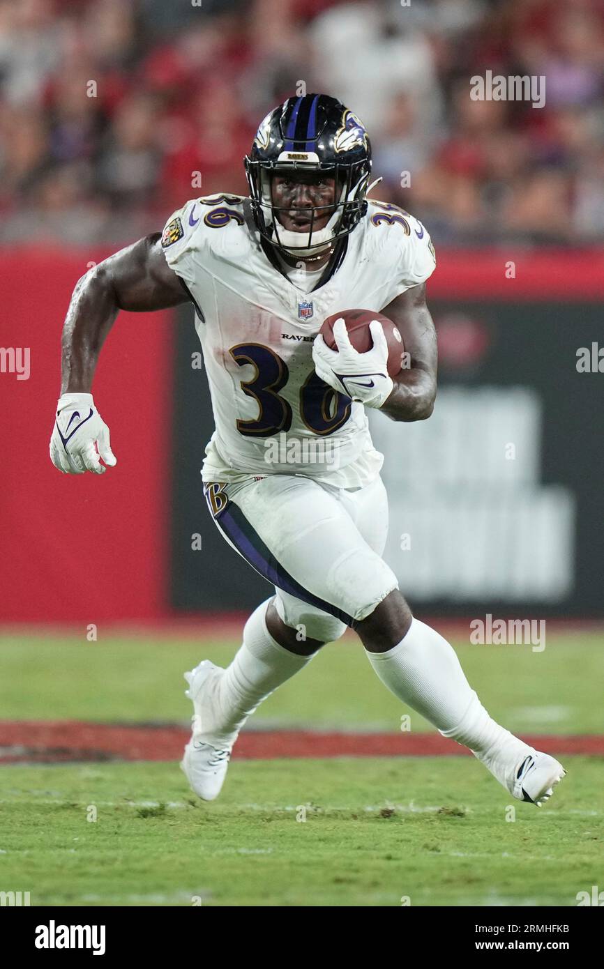 Baltimore Ravens running back Owen Wright (36) finds running room as he ...