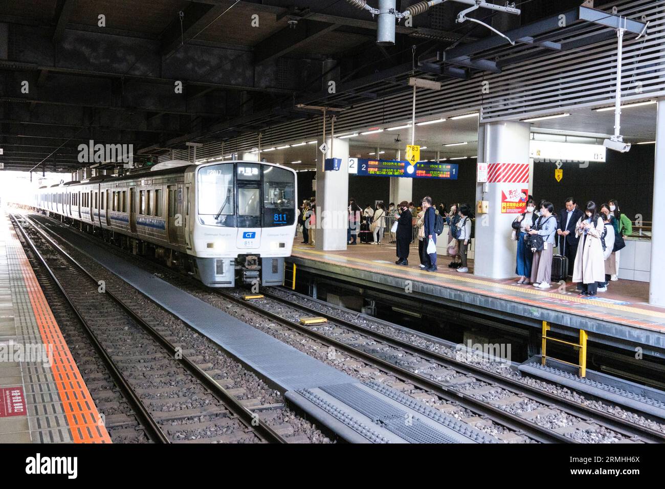 Japan, Fukuoka. Hakata Train Station Passengers Waiting for Train Stock ...