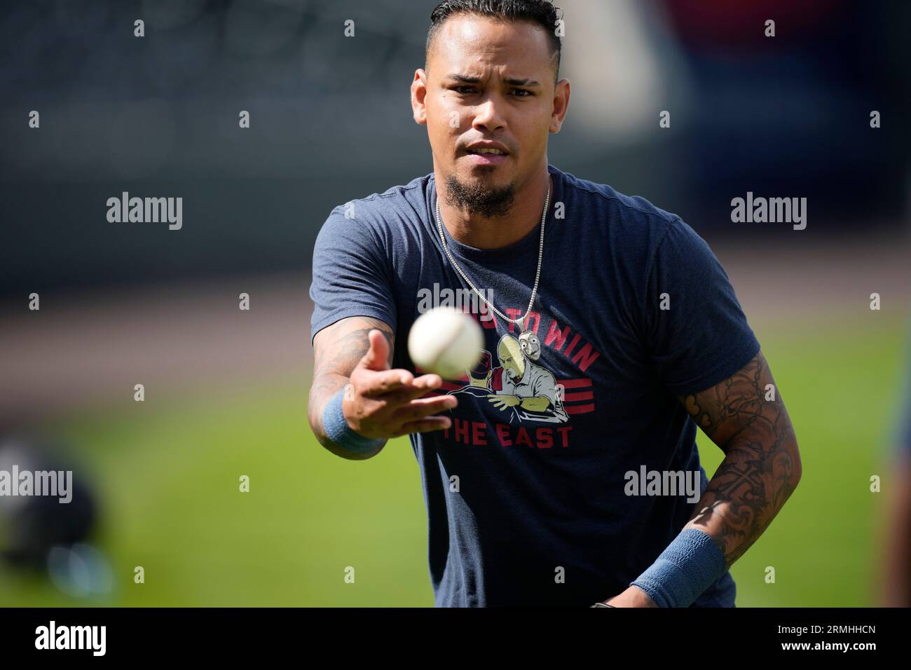 Atlanta Braves shortstop Orlando Arcia warms up before a baseball game ...