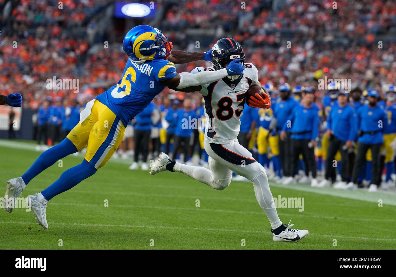 Los Angeles Rams cornerback Tre Tomlinson (6) stops Denver Broncos wide ...