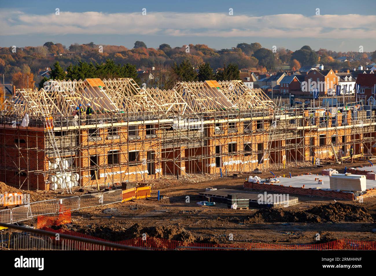 New housing estate at various stages of construction: from excavations ...