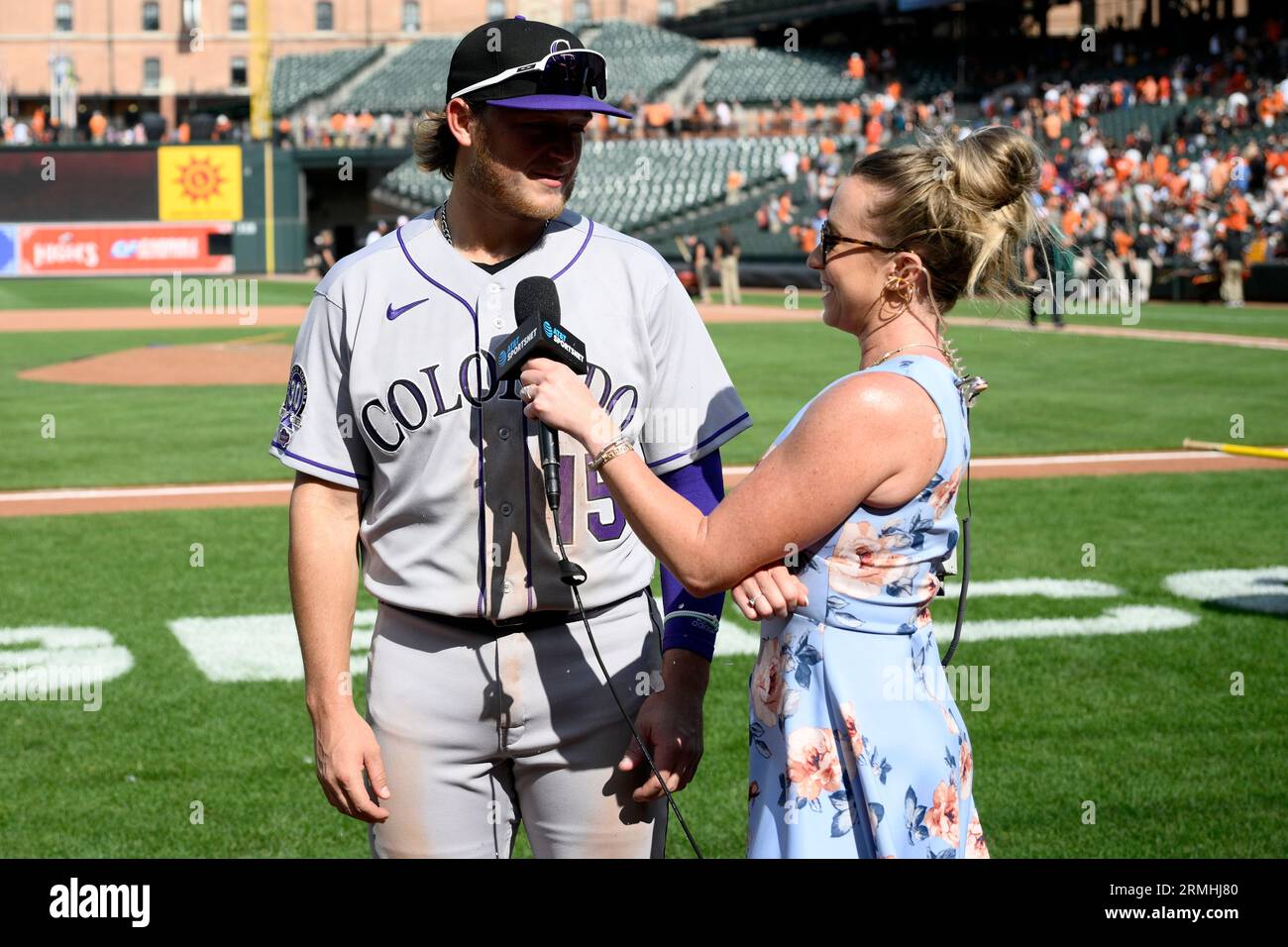 Colorado Rockies first baseman Hunter Goodman (15) gets interviewed ...
