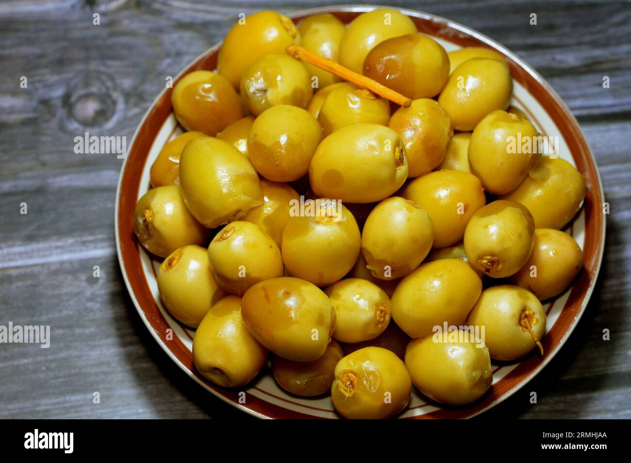 Yellow Barhi dates, botanically classified as Phoenix dactylifera ...