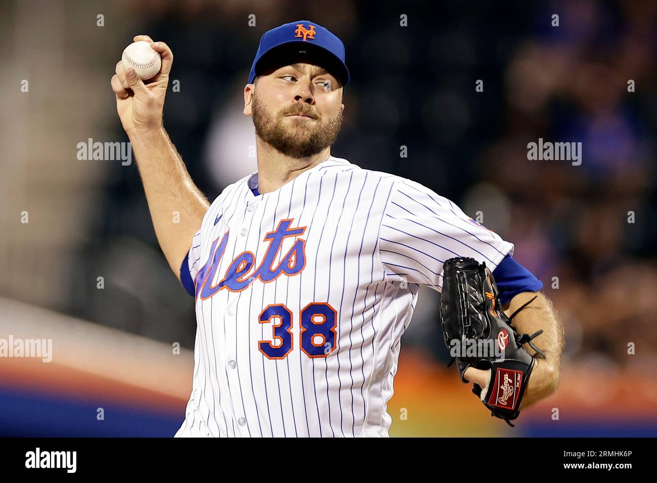 New York Mets pitcher Tylor Megill throws against the Texas Rangers ...