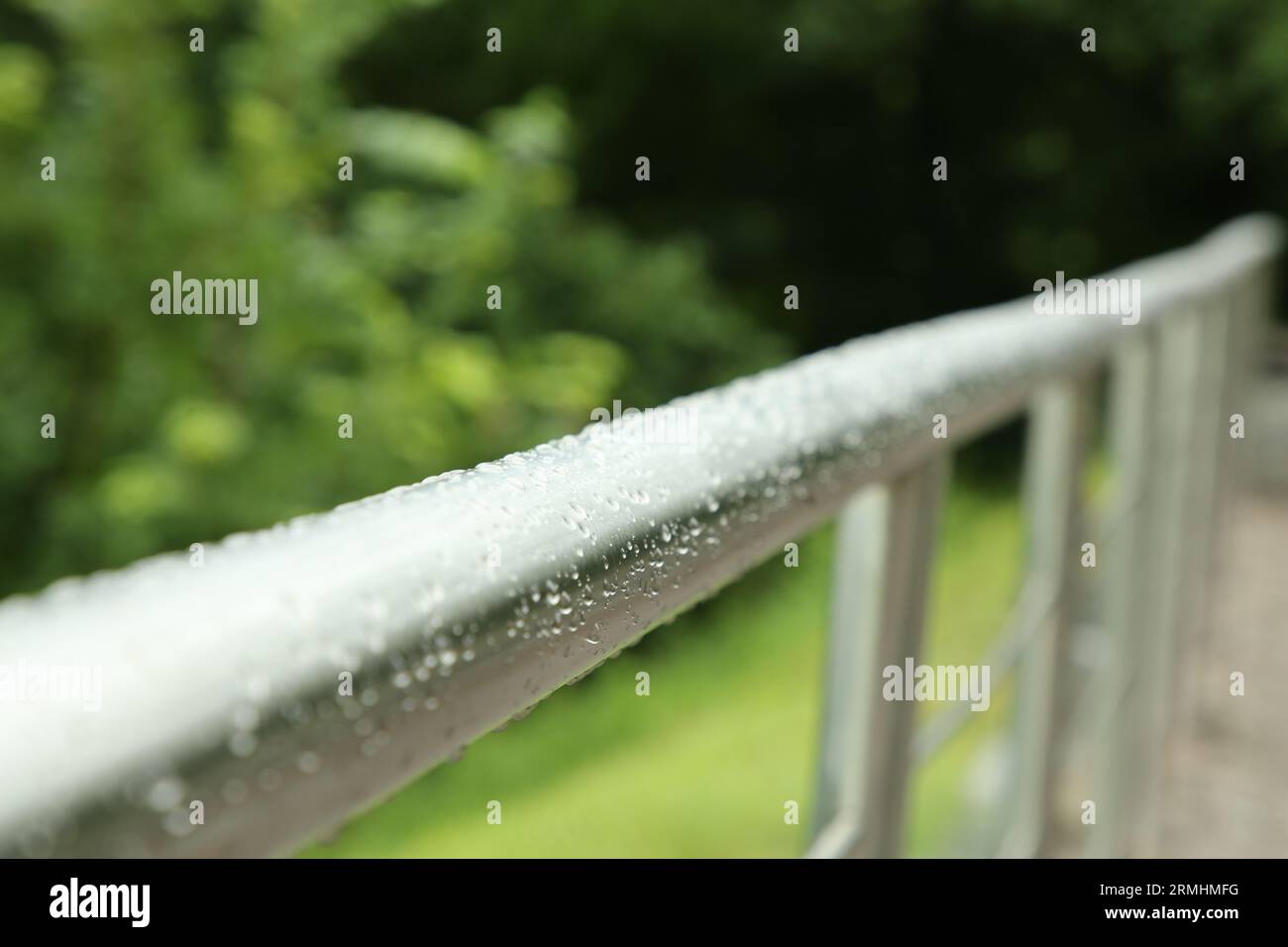 Metal railing with rain drops hi-res stock photography and images - Alamy