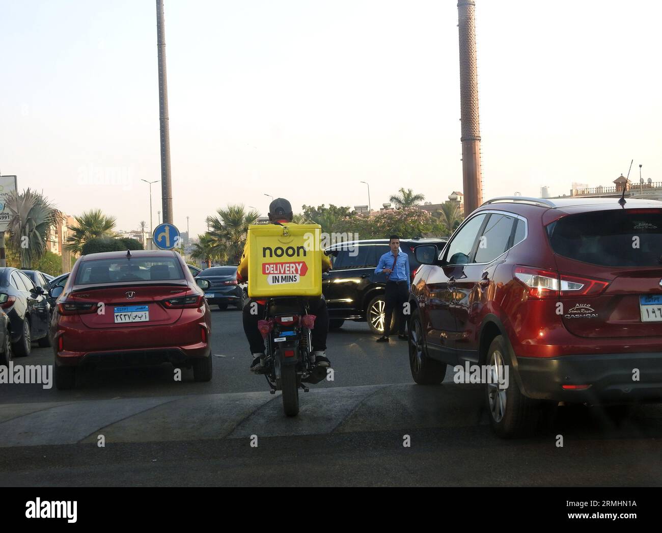 Cairo, Egypt, August 22 2023: Noon motorcycle delivery service on the ...