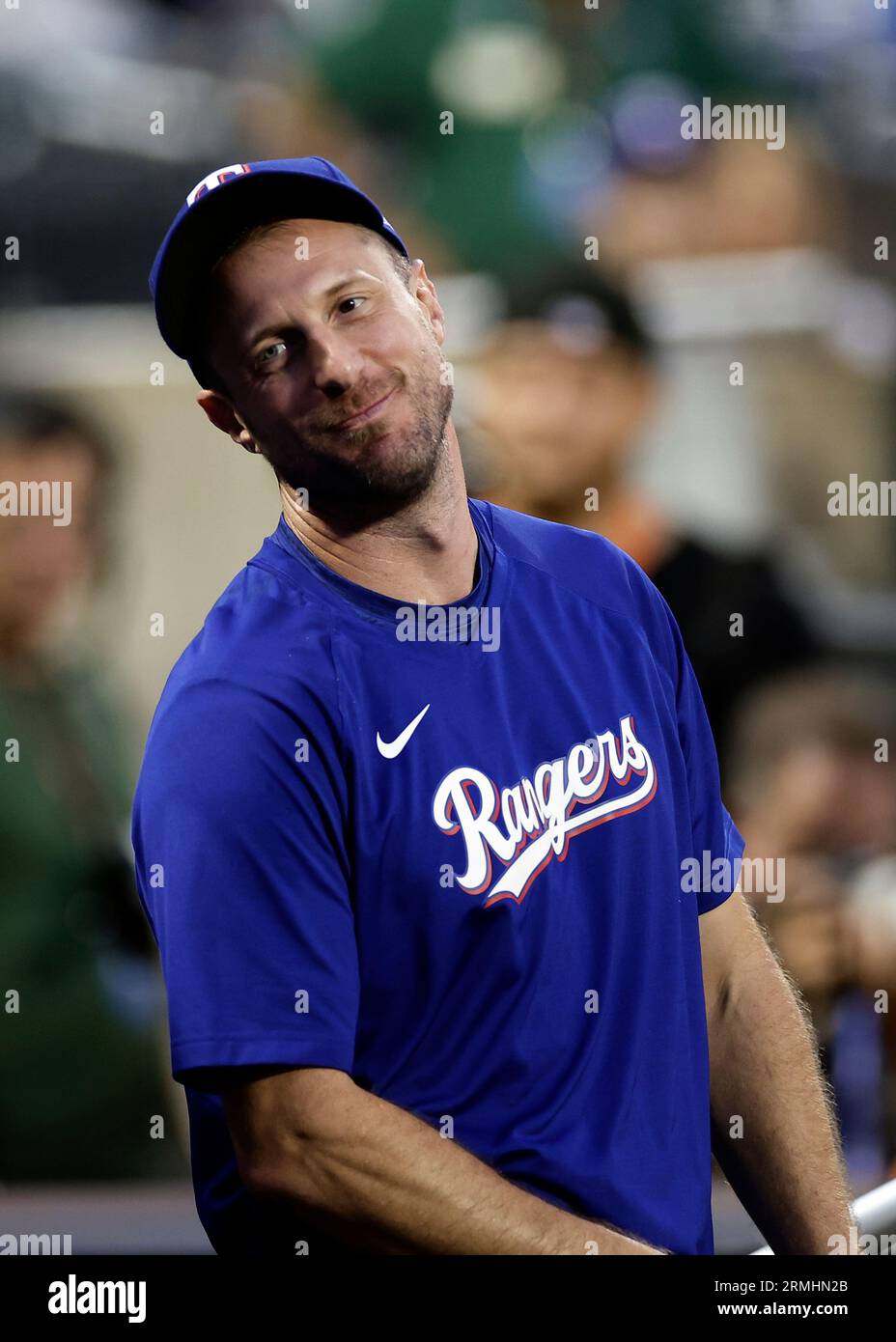 Texas Rangers' Max Scherzer looks on against the New York Mets during ...