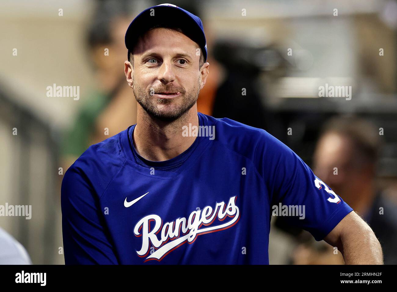 Texas Rangers' Max Scherzer looks on against the New York Mets during ...