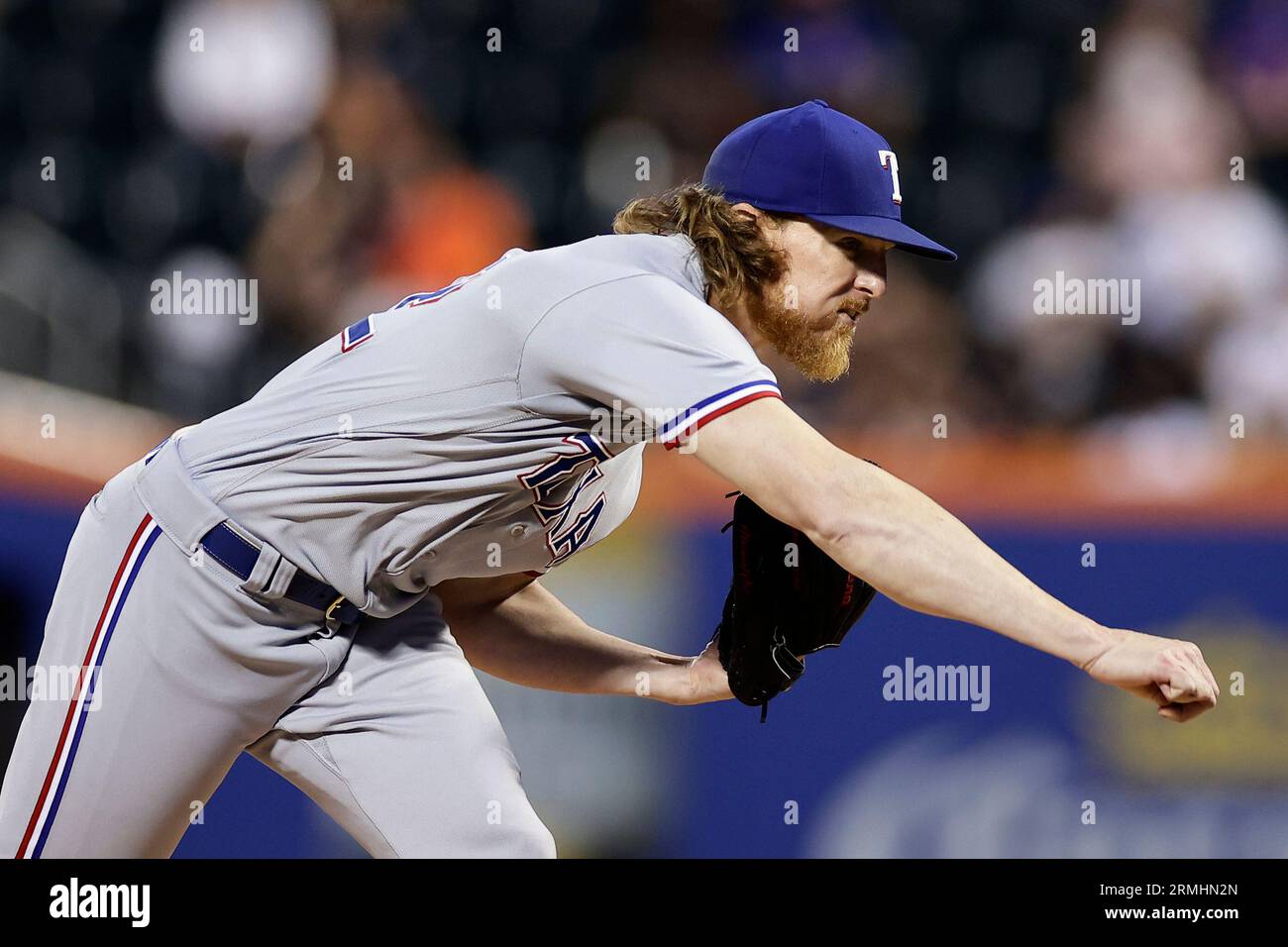 Texas Rangers pitcher Jon Gray throws against the New York Mets during ...