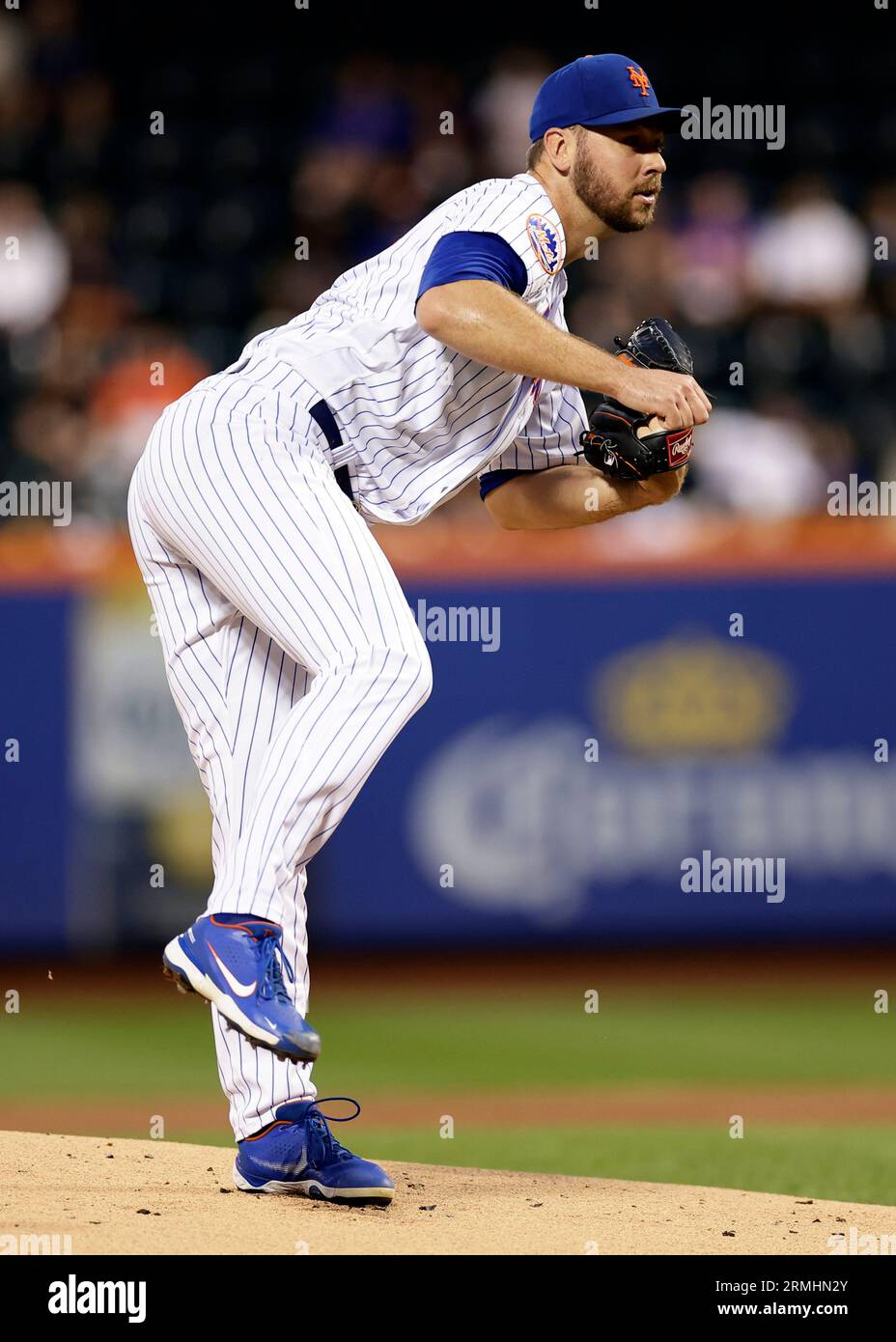 New York Mets pitcher Tylor Megill throws against the Texas Rangers ...